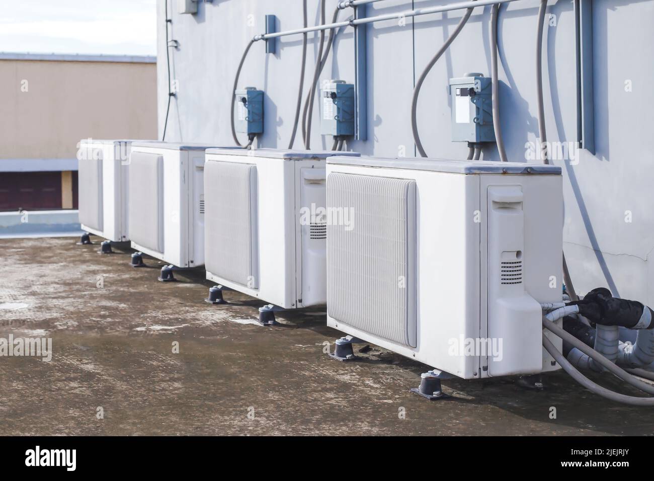 Air conditioner compressor installed outdoors Stock Photo - Alamy