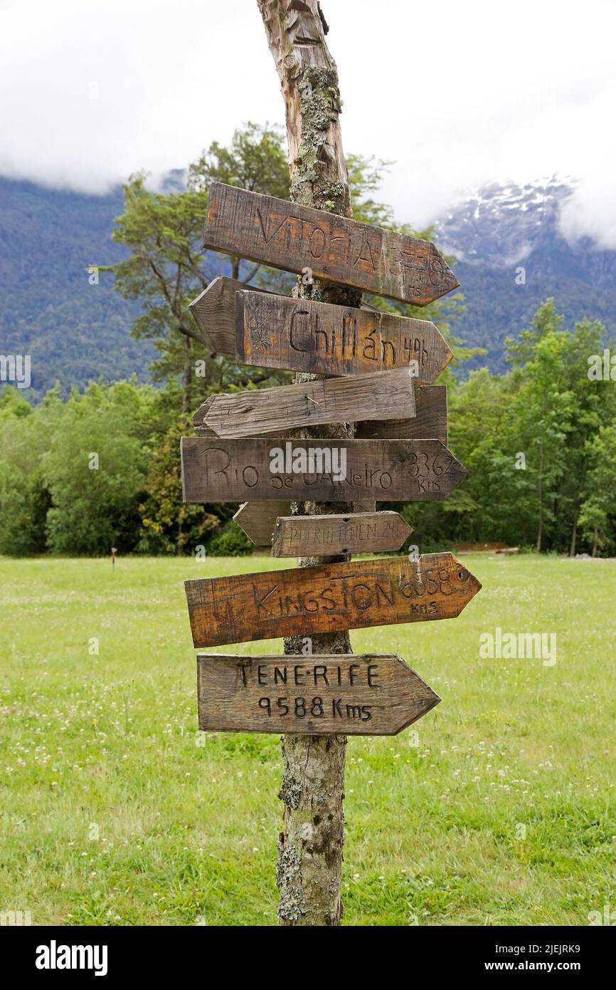 Direction signs at the Peulla locality, on the Lake Todos Los Santos ...