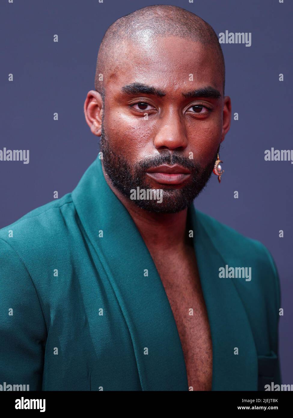 LOS ANGELES, CALIFORNIA, USA - JUNE 26: David Alan Madrick arrives at the BET Awards 2022 held ...