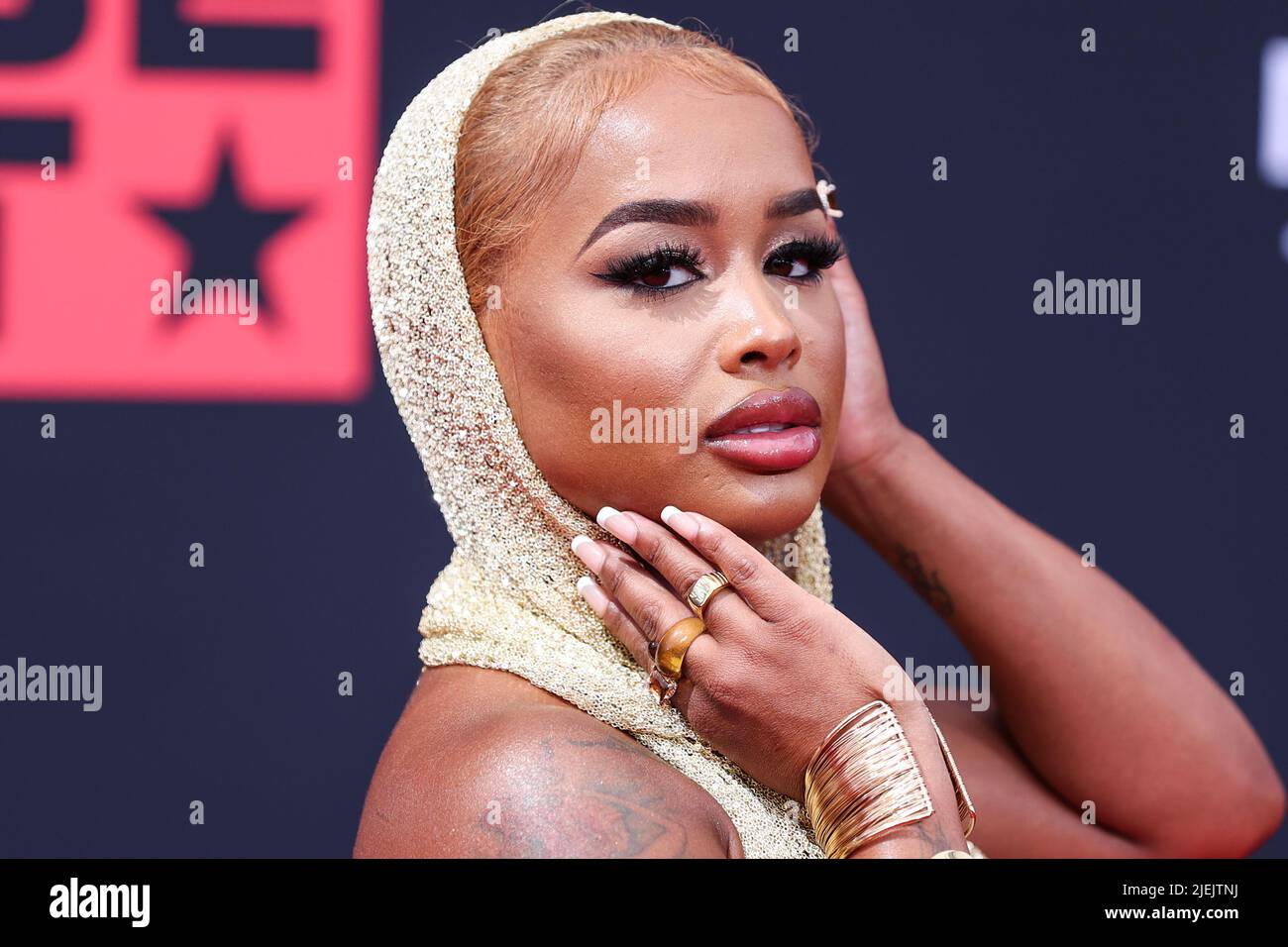 Gold halter strap hi-res stock photography and images - Alamy