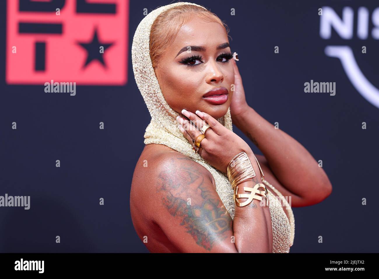 Gold halter strap hi-res stock photography and images - Alamy