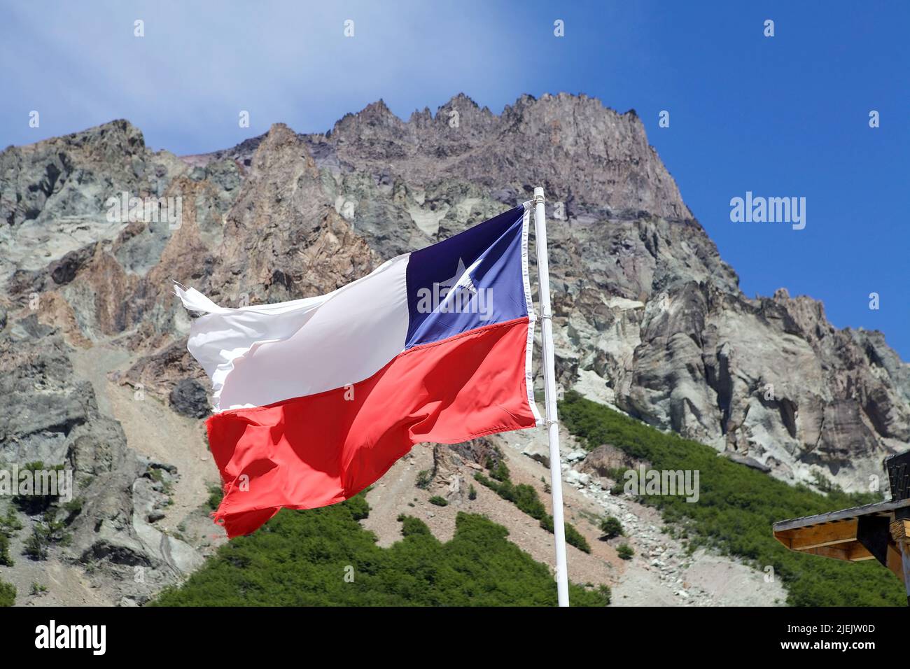Flag of Chile along the Carretera Austral, Chiel, with Andes in the ...