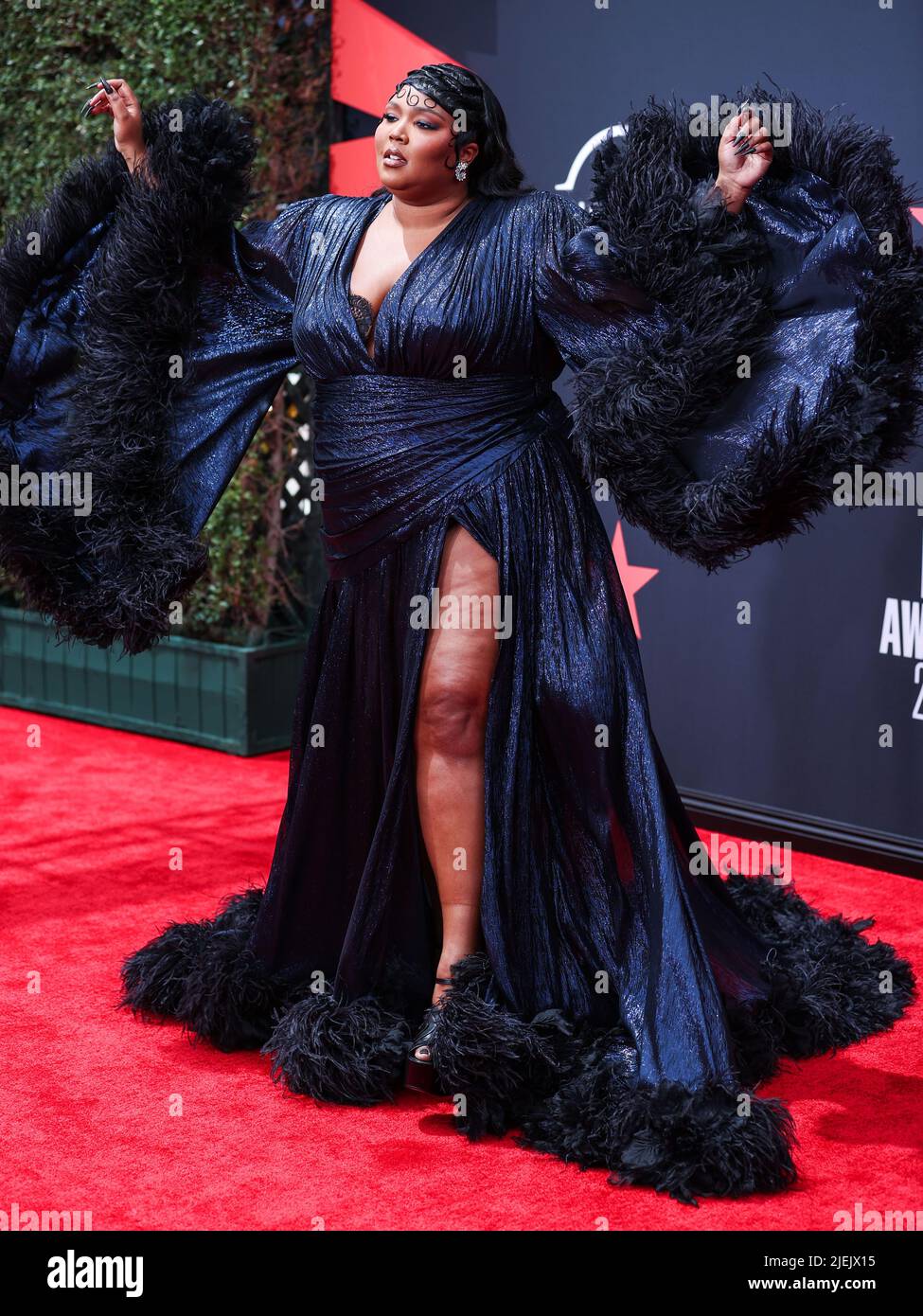 LOS ANGELES, CALIFORNIA, USA - JUNE 26: American singer Lizzo wearing a ...