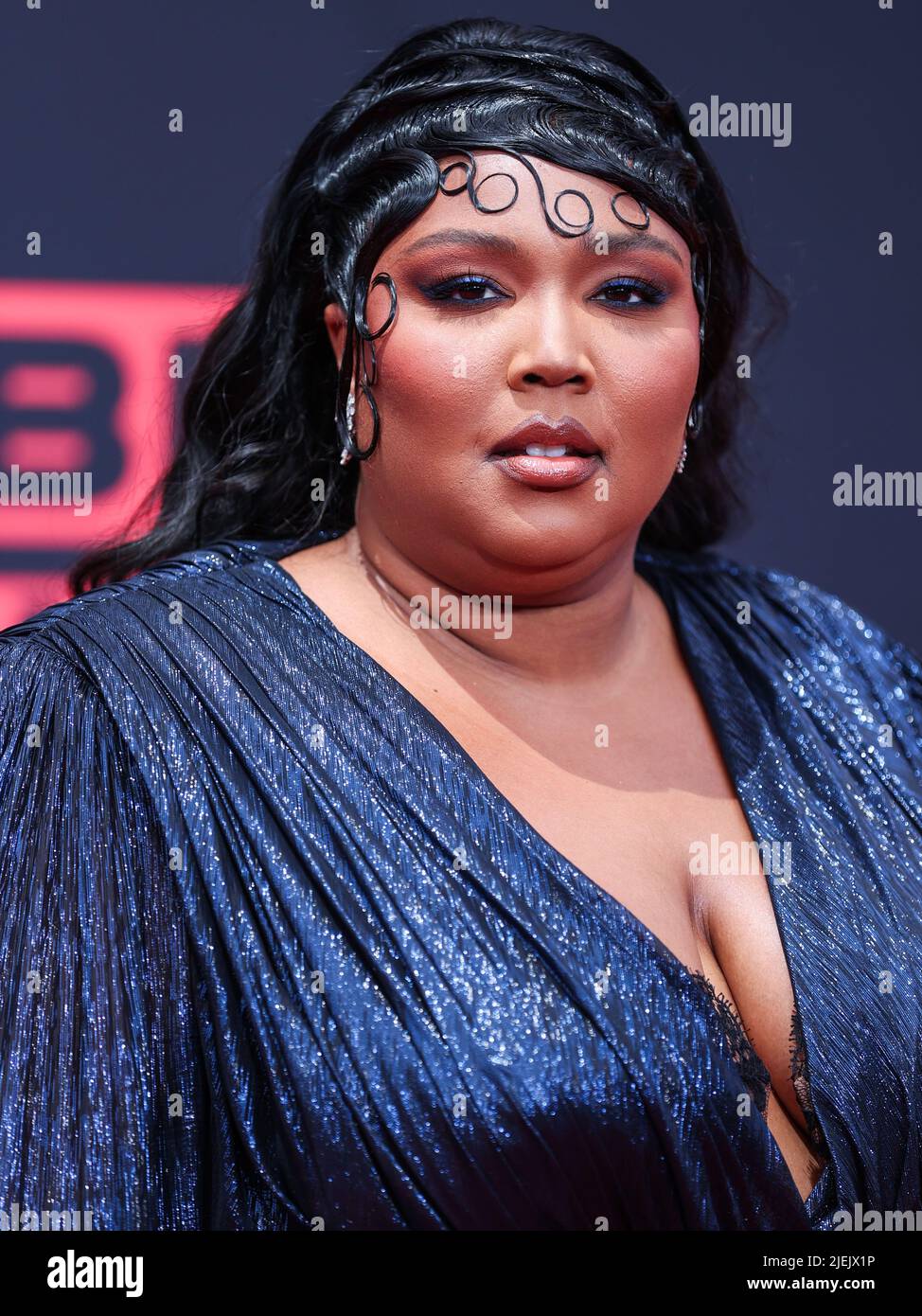 LOS ANGELES, CALIFORNIA, USA - JUNE 26: American singer Lizzo wearing a ...