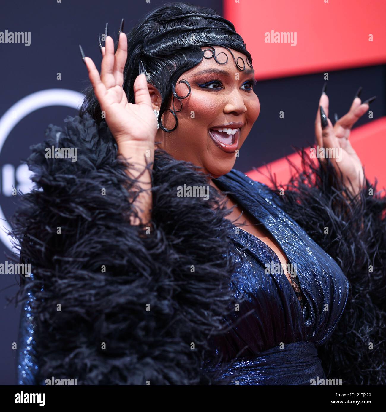 LOS ANGELES, CALIFORNIA, USA - JUNE 26: American singer Lizzo wearing a ...