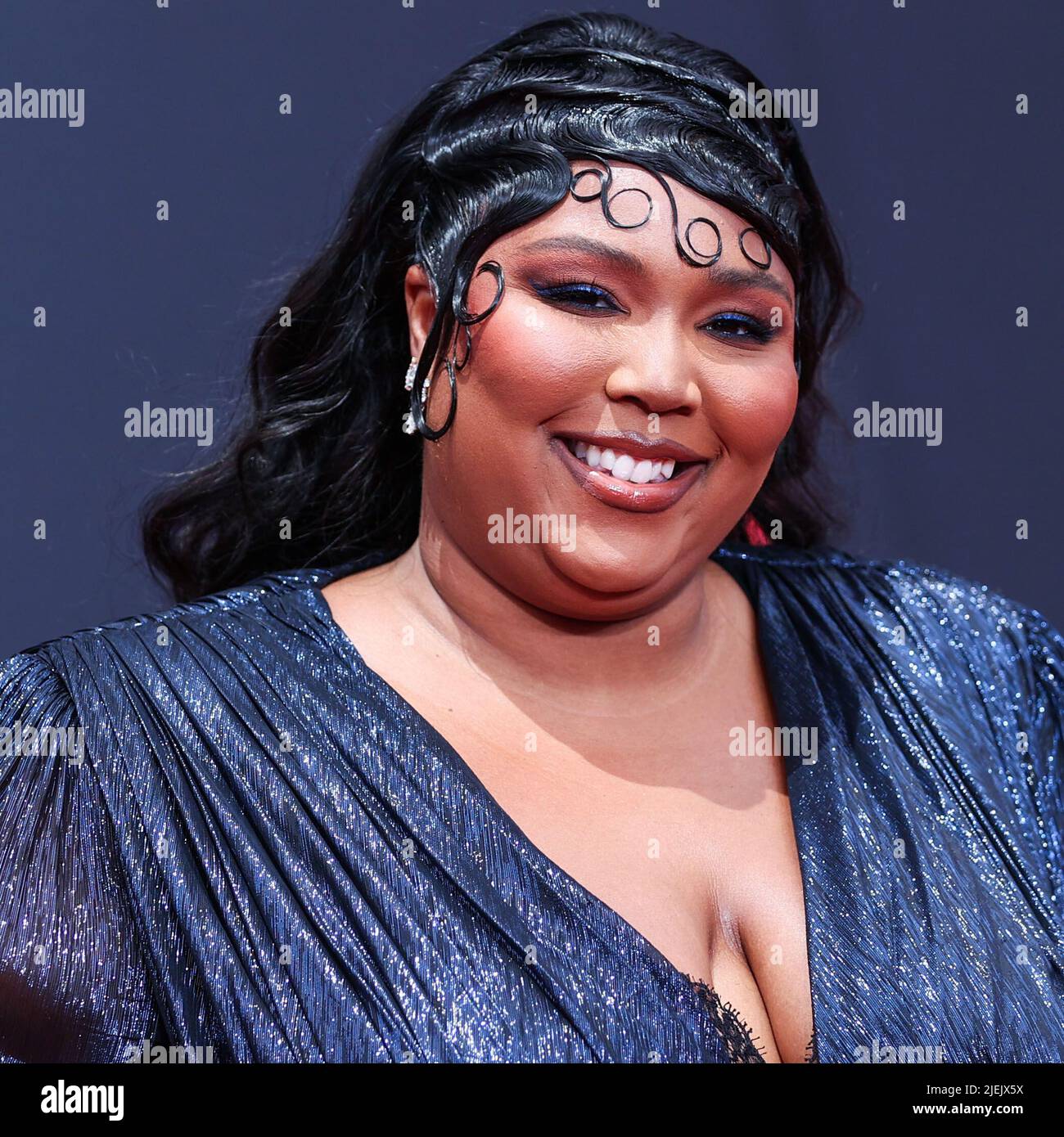 LOS ANGELES, CALIFORNIA, USA - JUNE 26: American singer Lizzo wearing a ...