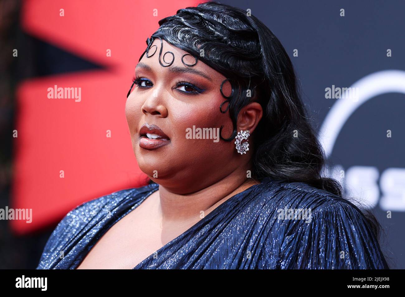 LOS ANGELES, CALIFORNIA, USA - JUNE 26: American singer Lizzo wearing a ...
