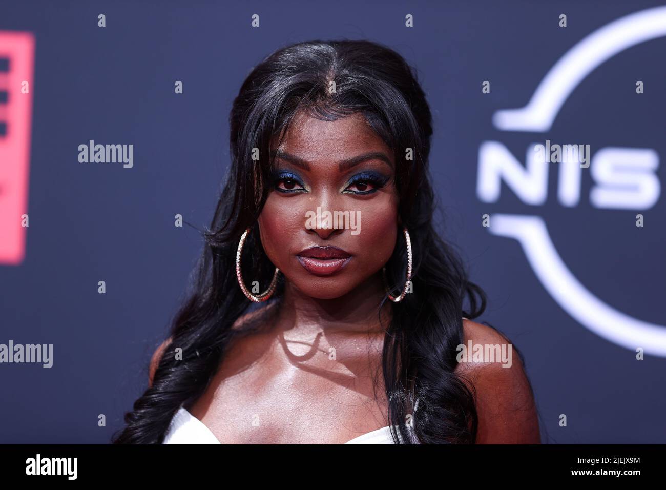 LOS ANGELES, CALIFORNIA, USA - JUNE 26: Loren Lott arrives at the BET ...