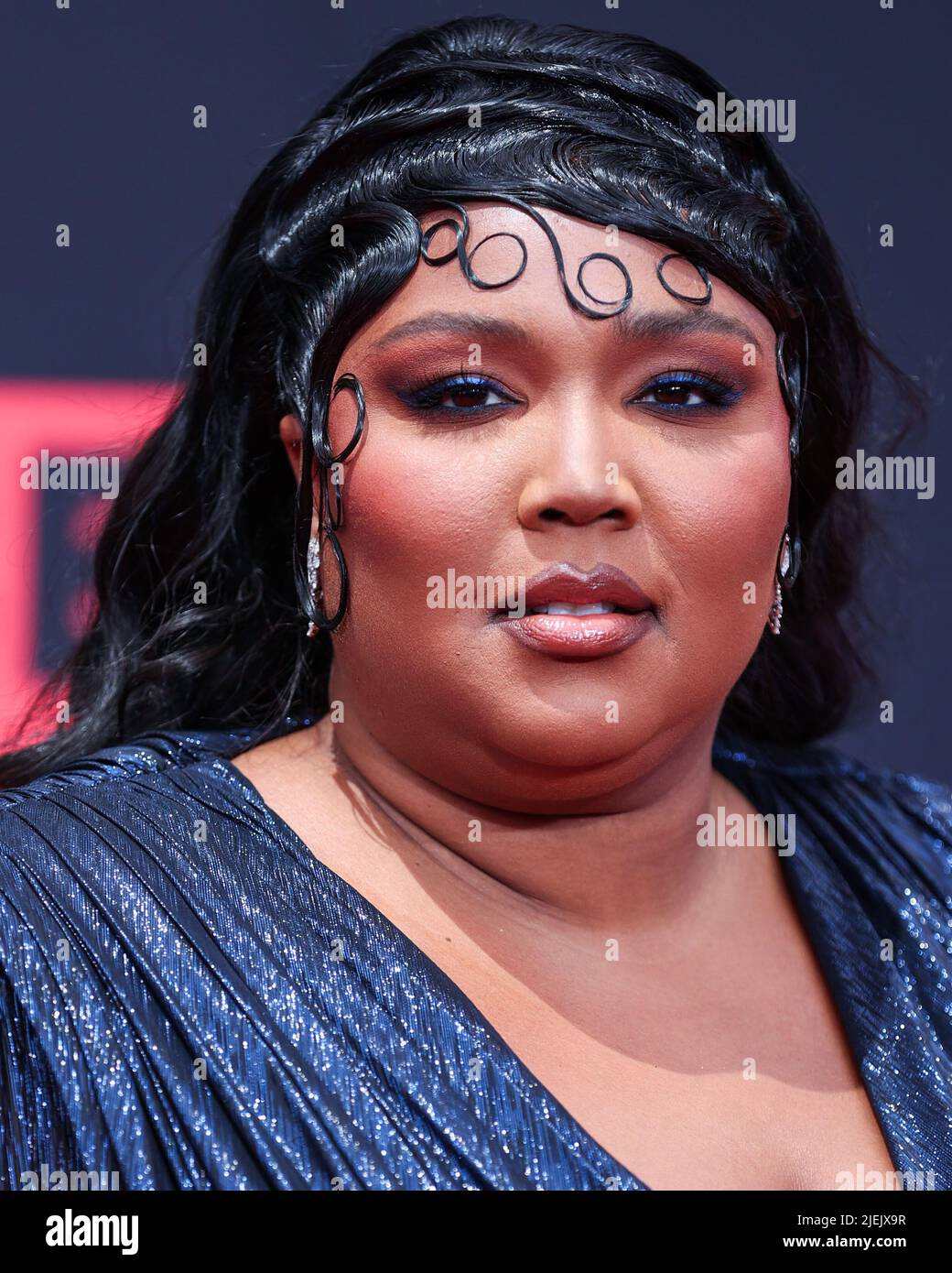 LOS ANGELES, CALIFORNIA, USA - JUNE 26: American singer Lizzo wearing a ...