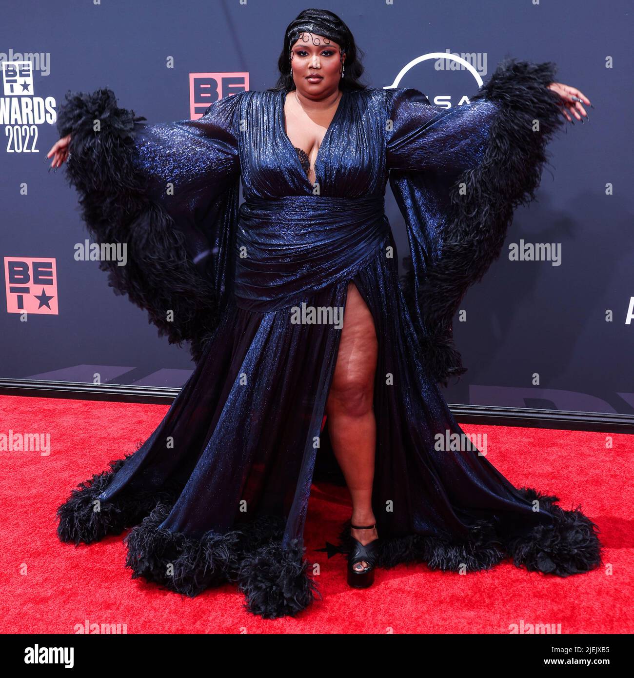 LOS ANGELES, CALIFORNIA, USA - JUNE 26: American singer Lizzo wearing a ...