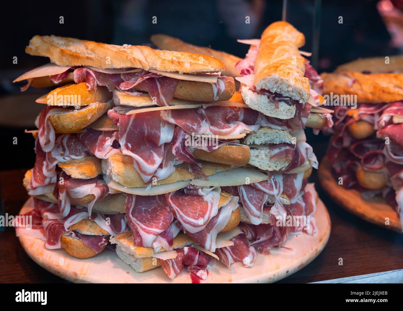 Sandwiches with Spanish ham on bar window in Madrid Stock Photo - Alamy
