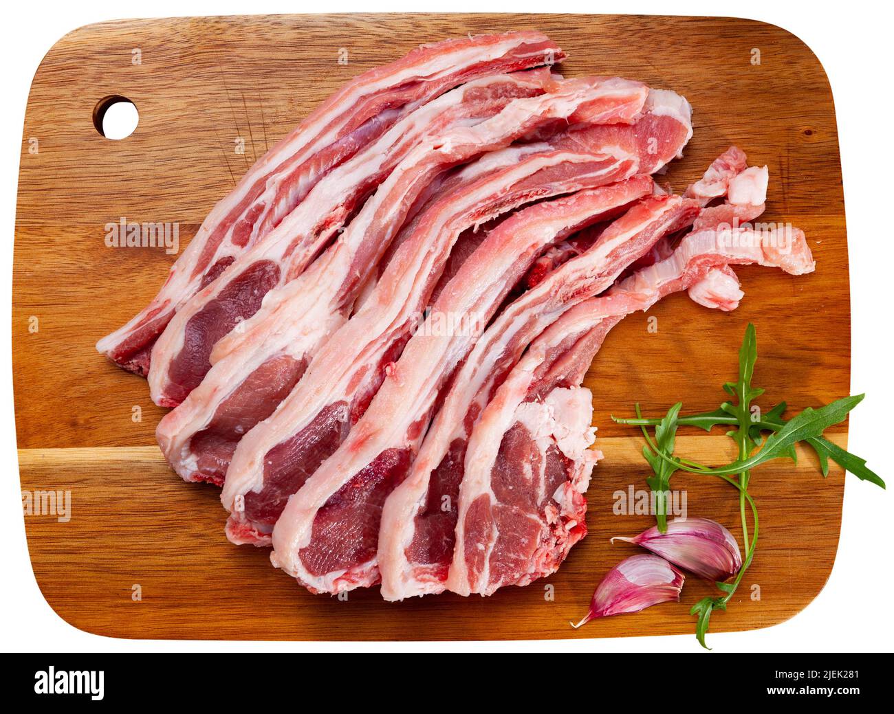 Sliced fresh raw lamb for chops on a chopping board Stock Photo - Alamy