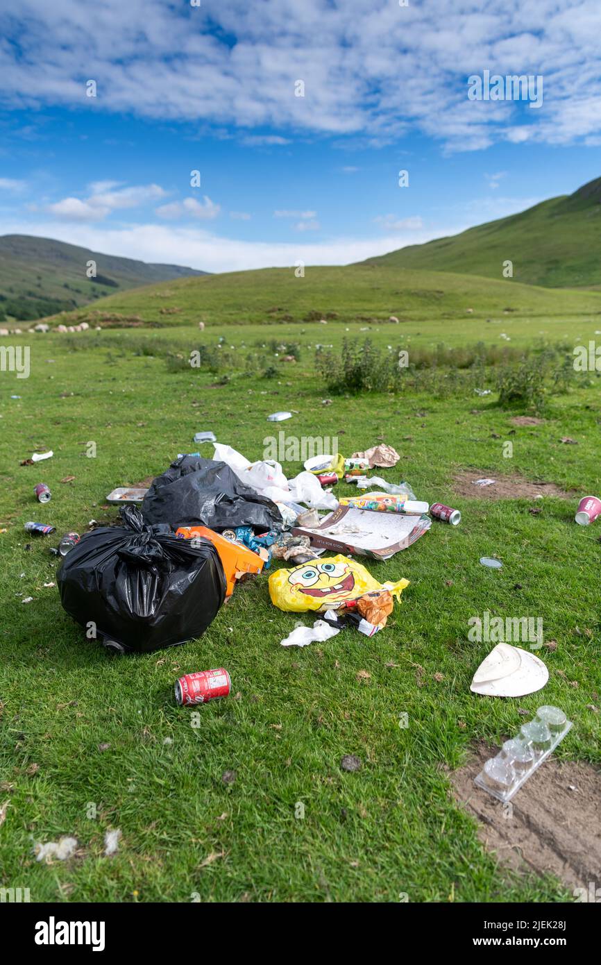 Rubbish left in countryside after campers have left their litter after ...