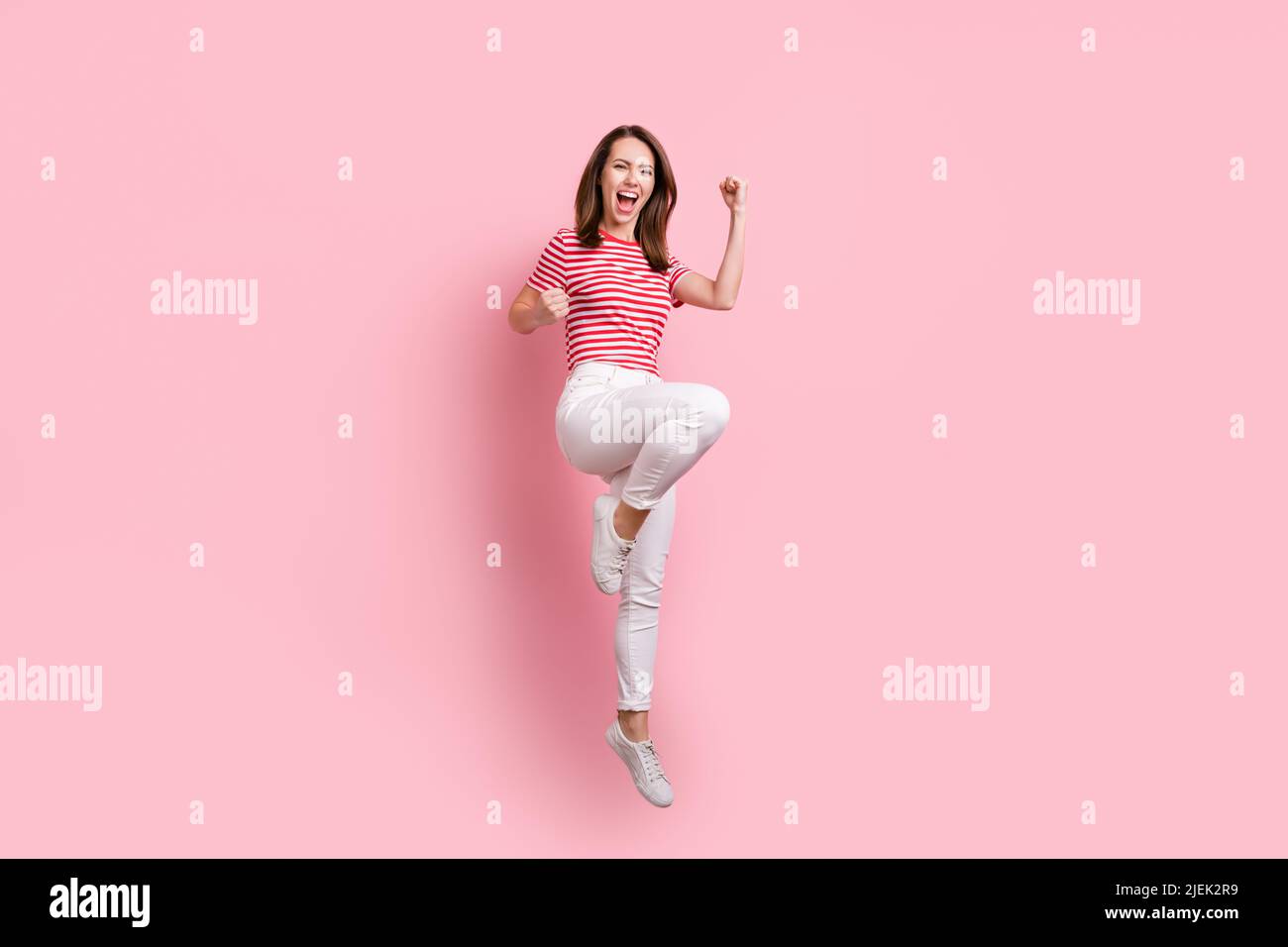 Full size photo of young girl happy positive smile jump rejoice win ...