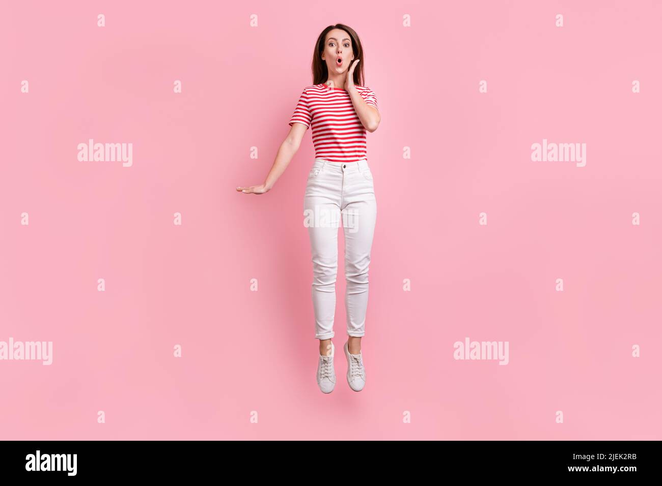 Full size photo of young girl amazed shocked jump show hand size ...