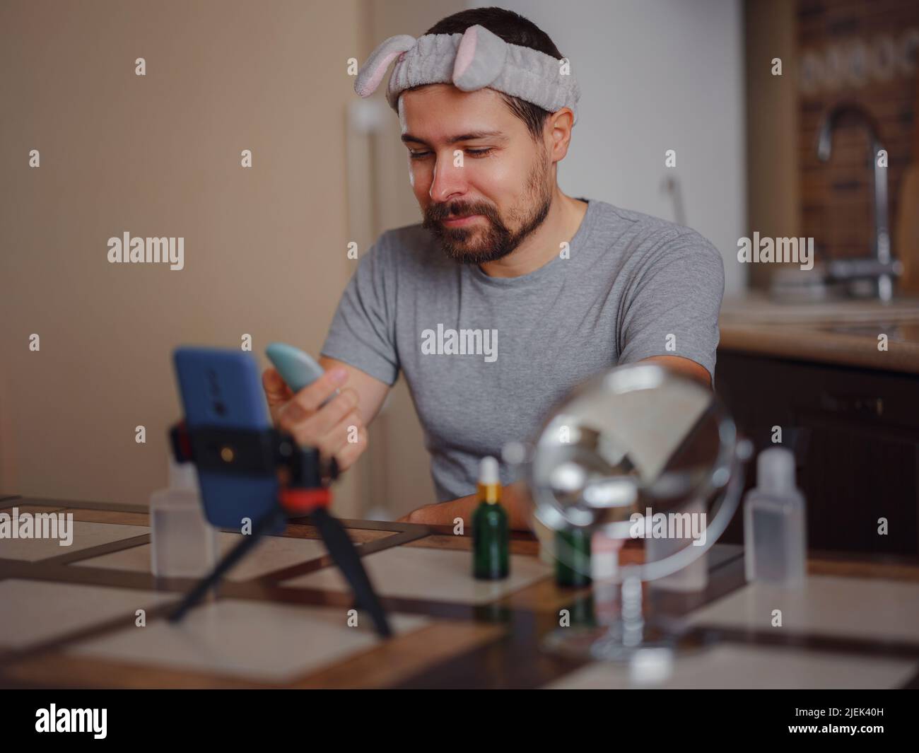 Men's beauty concept. caucAsian guy checking his skin. Beauty blogger ...