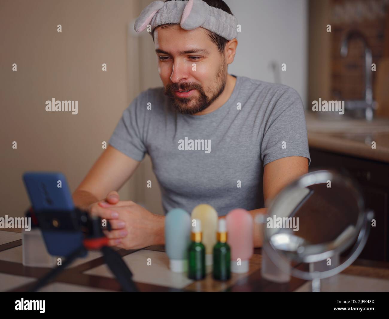 Men's beauty concept. caucAsian guy checking his skin. Beauty blogger ...