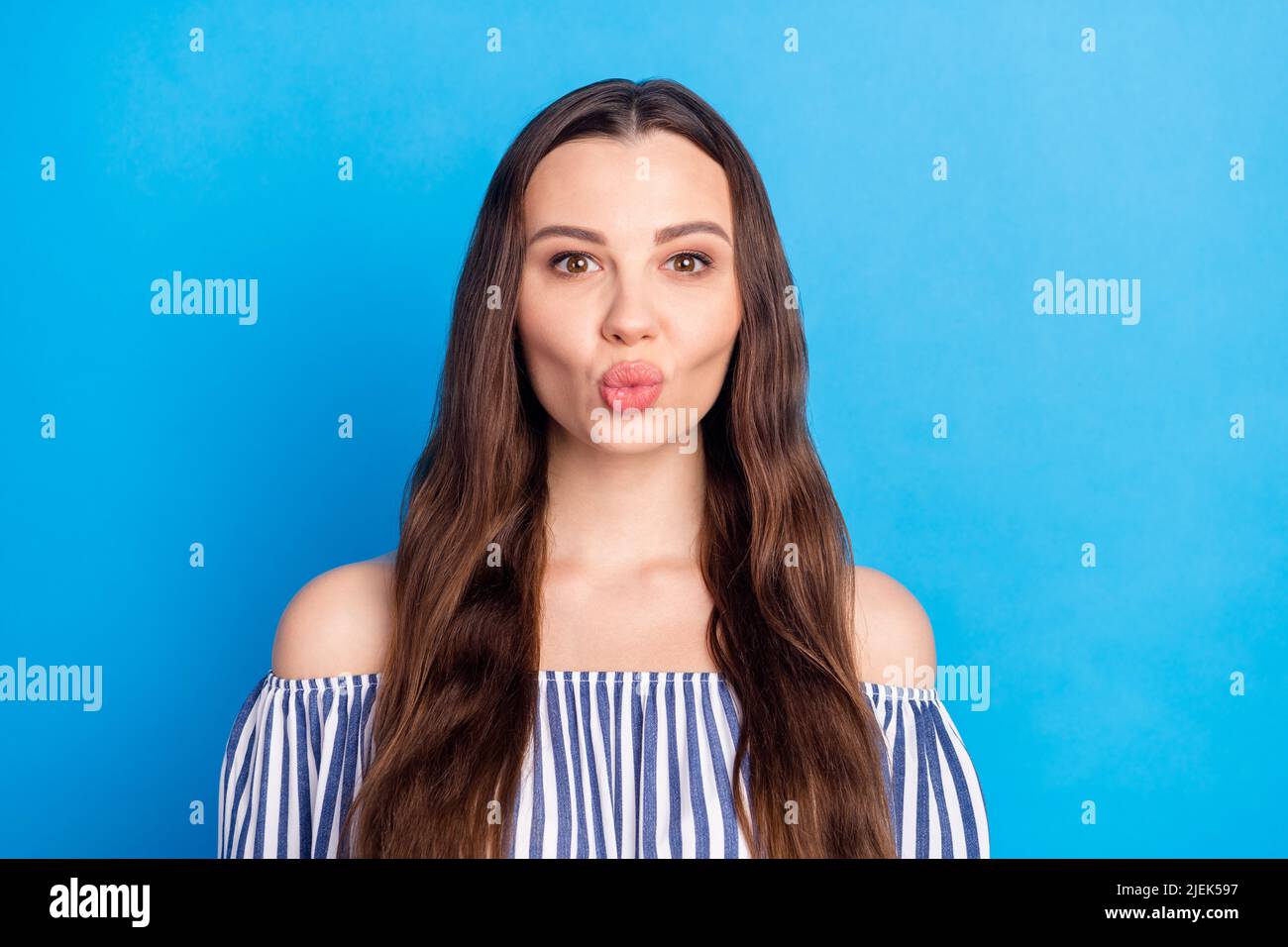 Photo of charming flirty young woman dressed striped outfit sending you ...