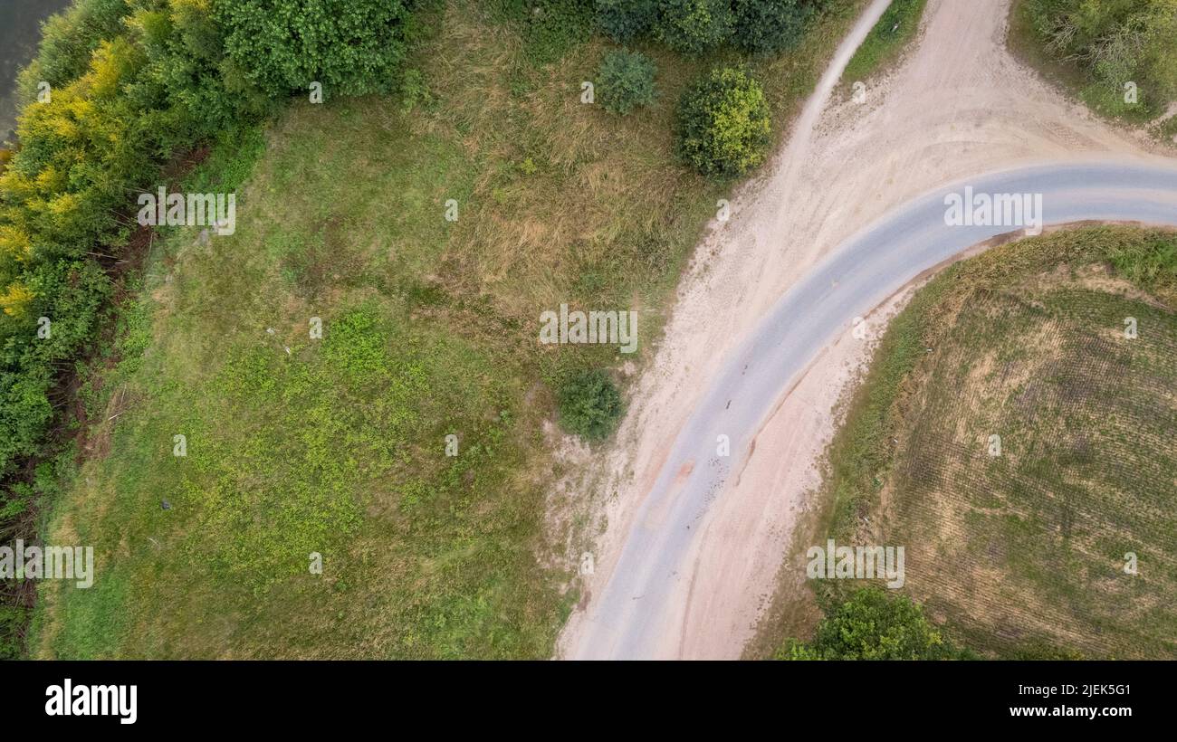 Drone image. aerial view of rural area with fields, trees, paths and ...
