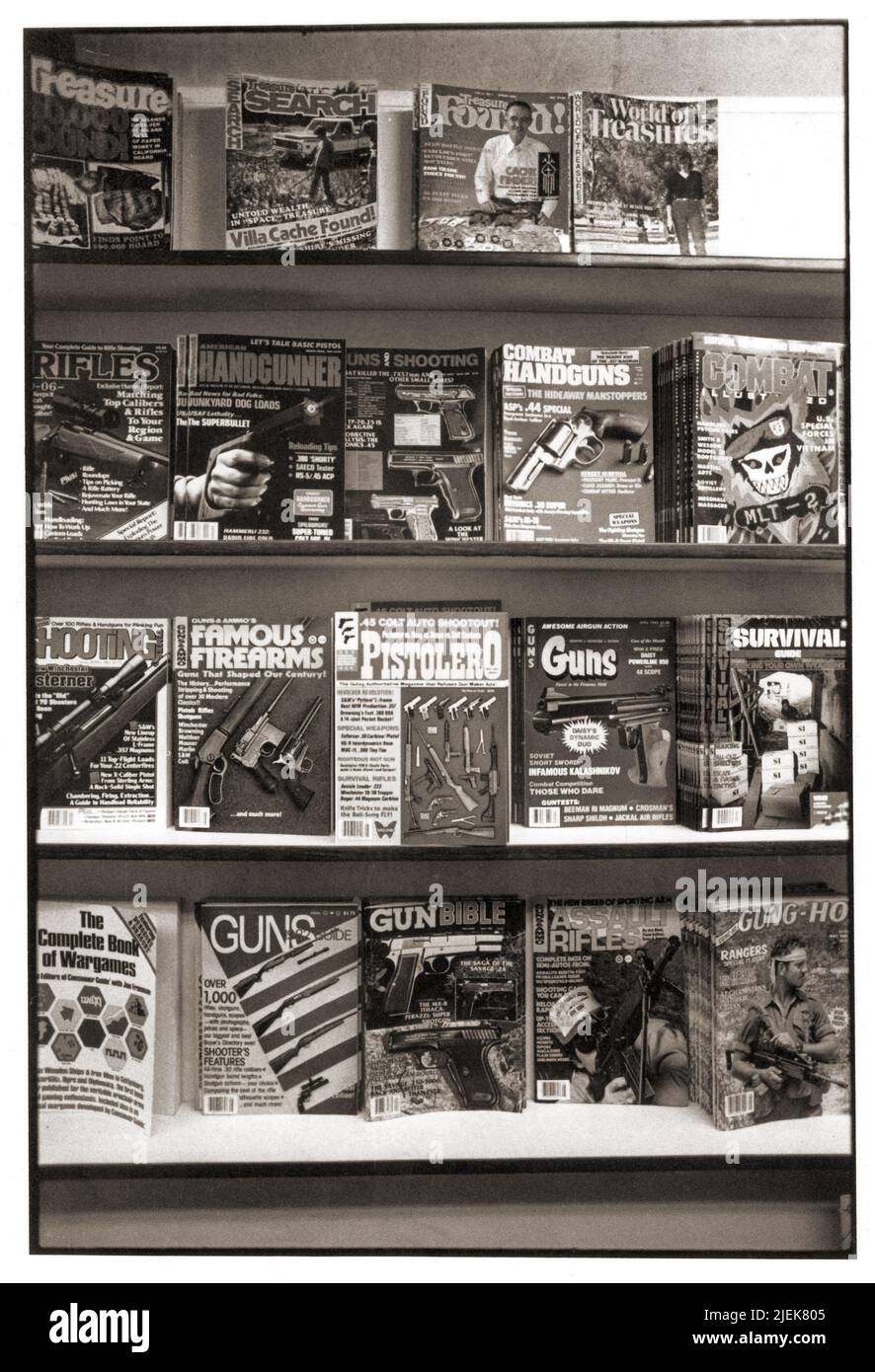 A rack of gun, rifle, survival, and firearm magazines for sale in the ...