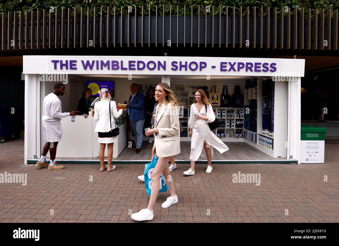 Spectators at a express Wimbledon shop during day one of the 2022 ...