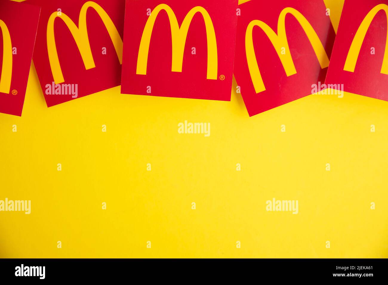 LONDON, UK - June 2022: McDonalds iconic logo against a yellow ...