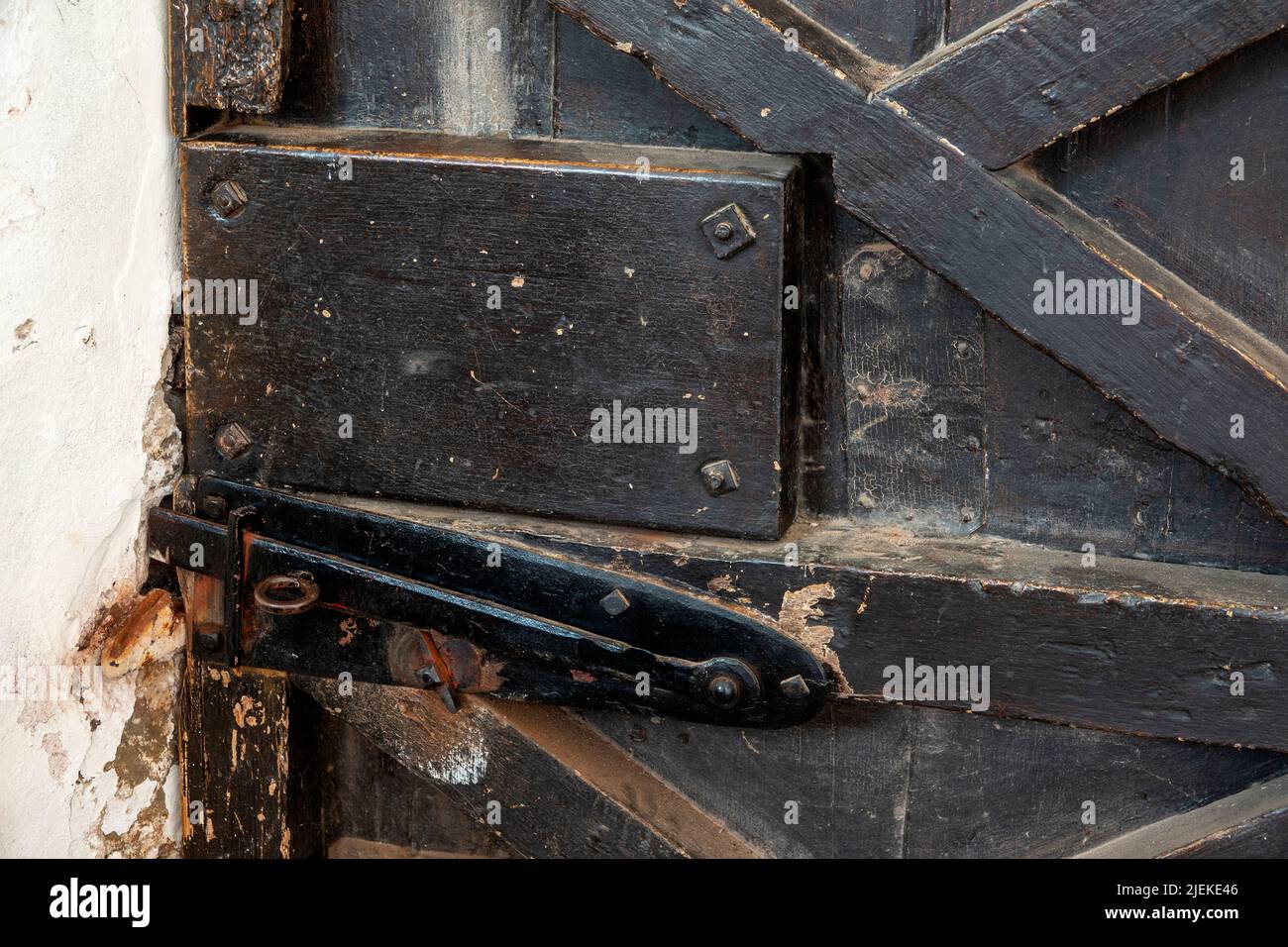 Wood and metal church door lock at St Michael's Tunstall, Suffolk Stock ...