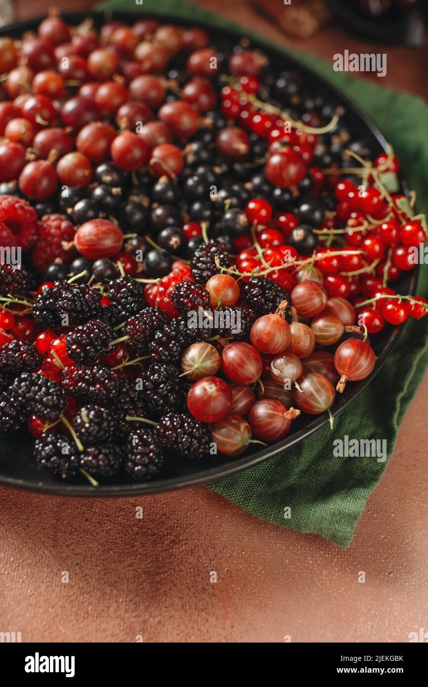 food photography in low key, fruits and berries vitamins, food for ...