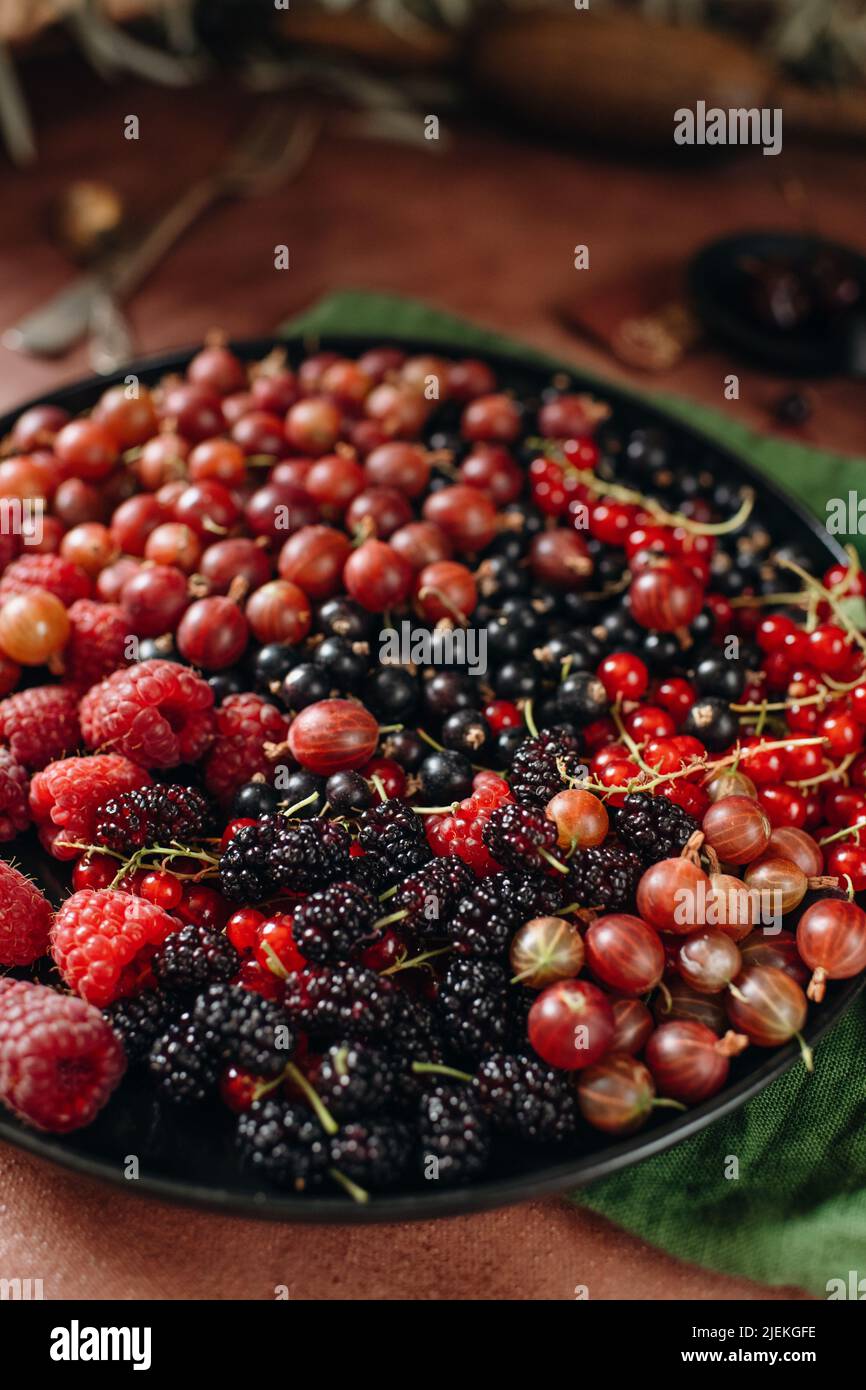 food photography in low key, fruits and berries vitamins, food for ...