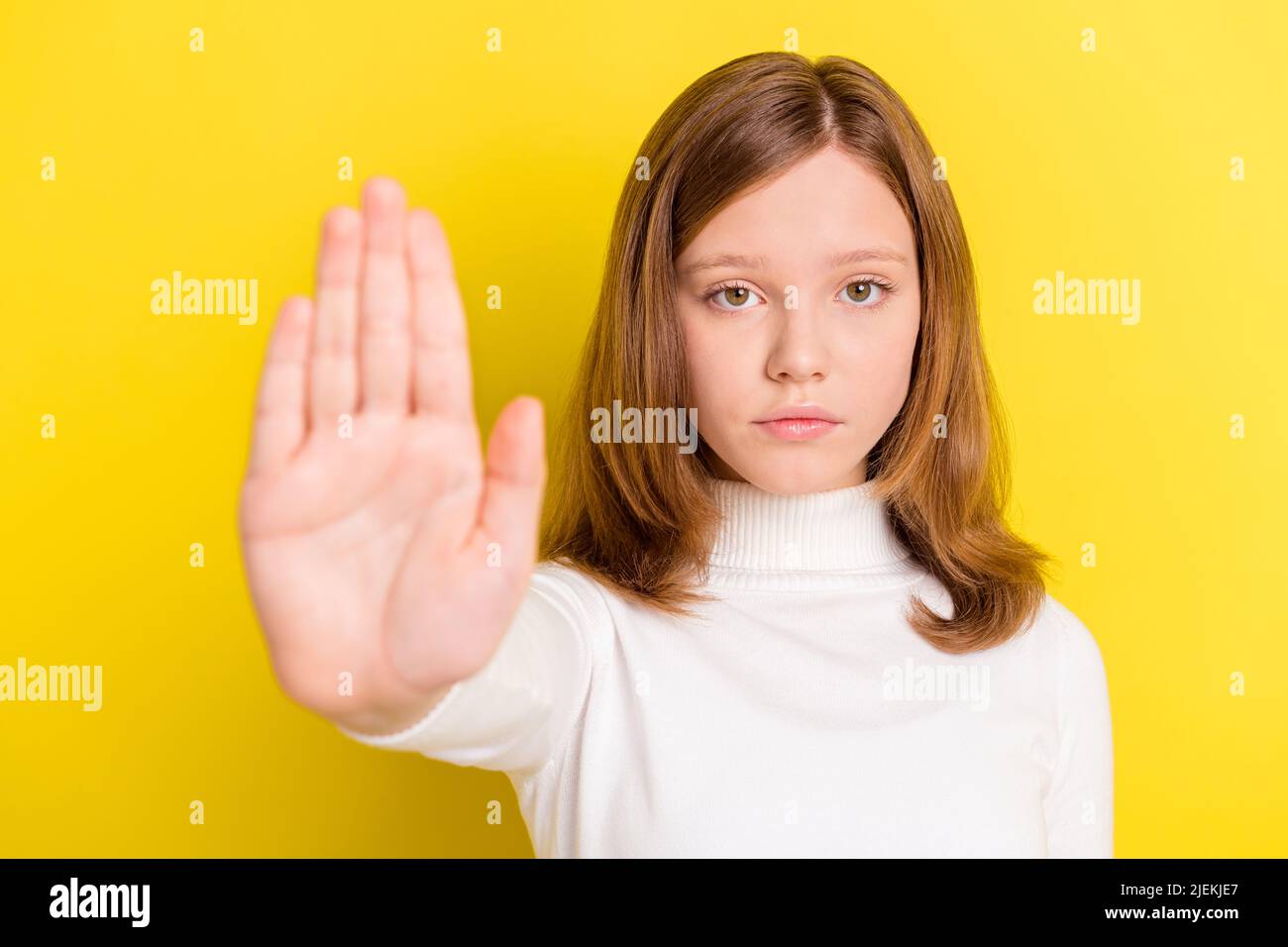 Photo of young girl show hand stop rules ban block decline rejection ...