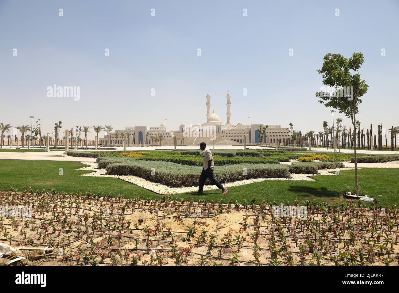 Cairo, Egypt. 27th June, 2022. A man walks on the square in front of a ...