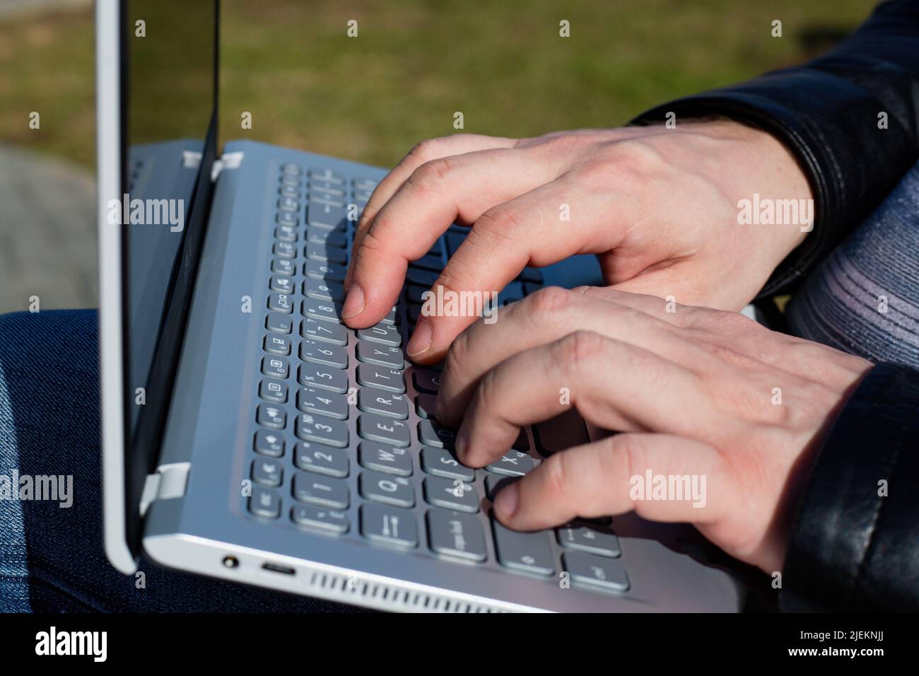 Freelancer hands computer keyboard typing message text Stock Photo - Alamy