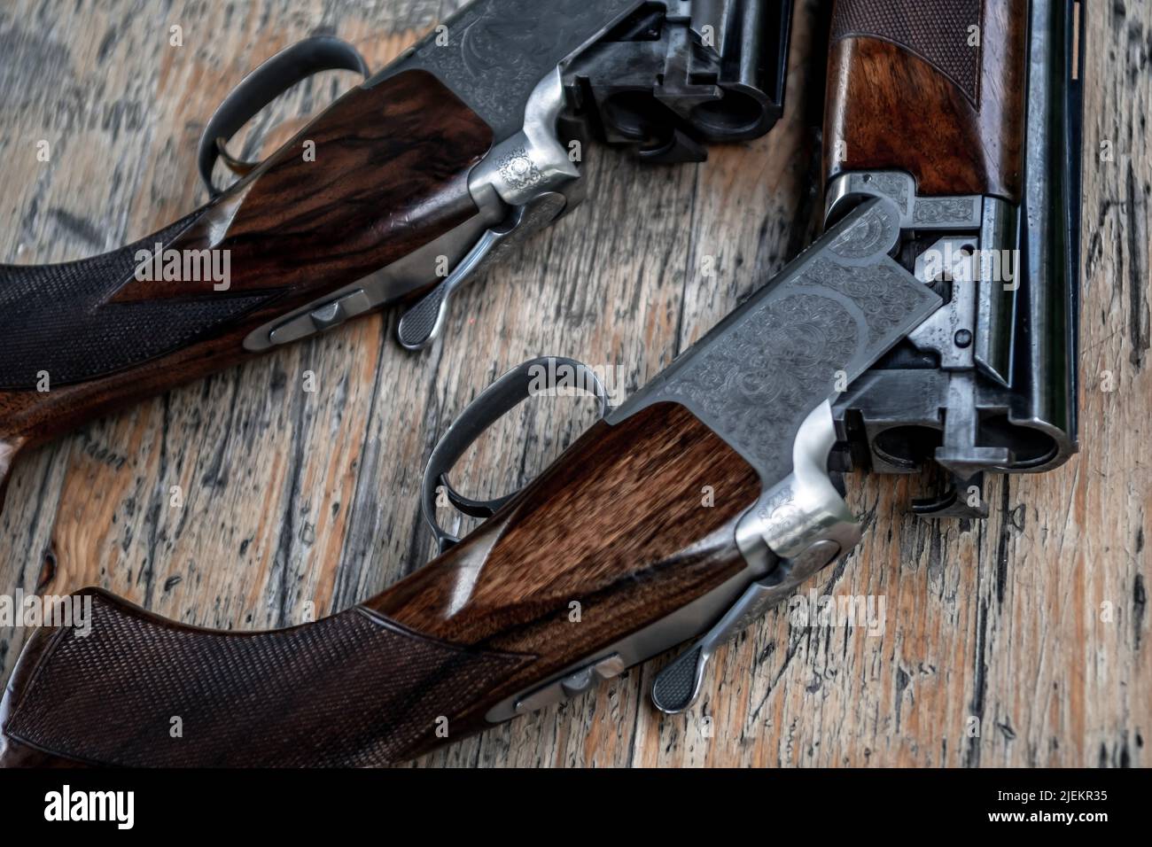 Detail Of Open Hunting Rifles Laying On Table Stock Photo - Alamy