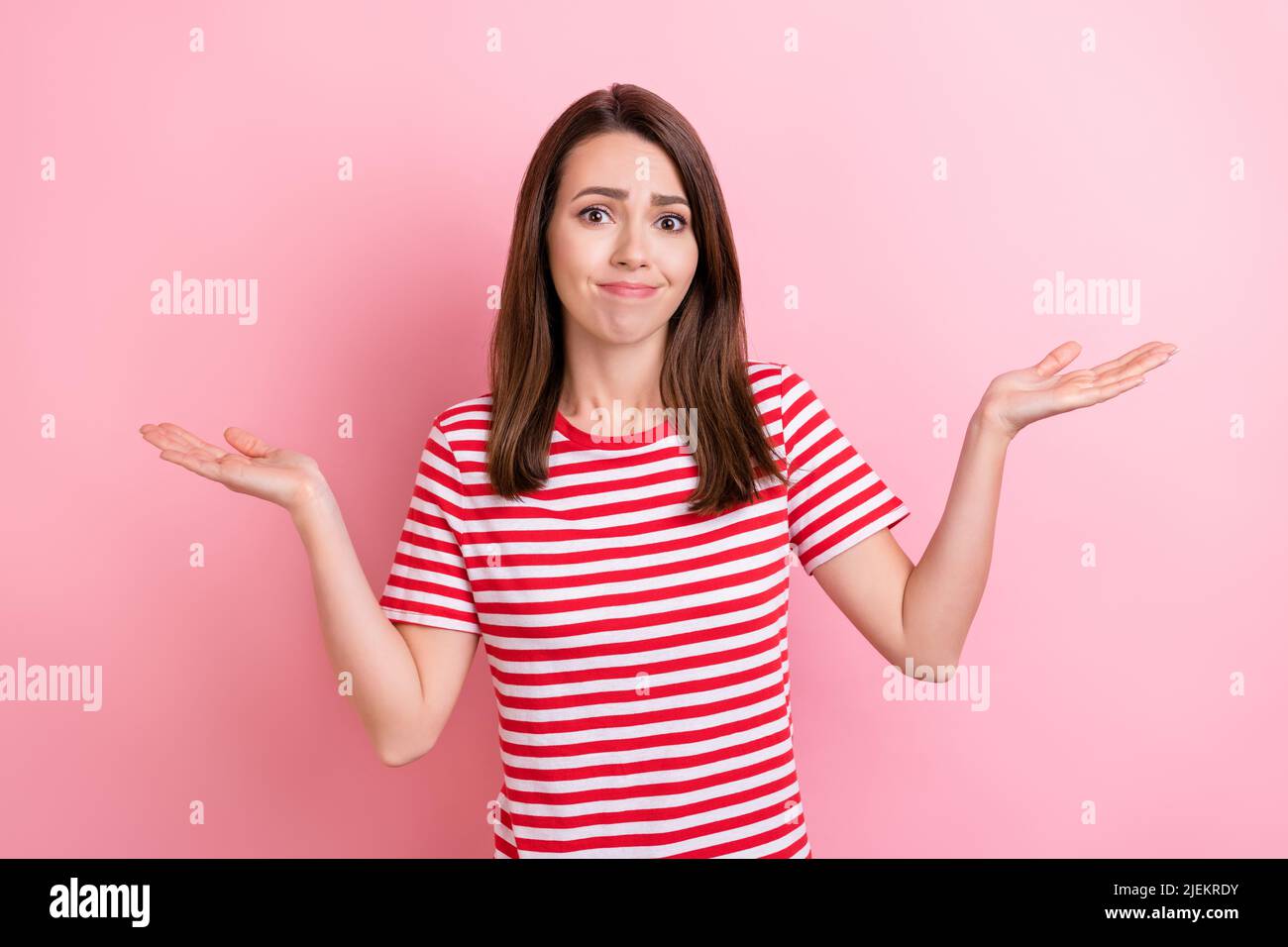 Photo of young woman unhappy sad shrug shoulders clueless confused ...
