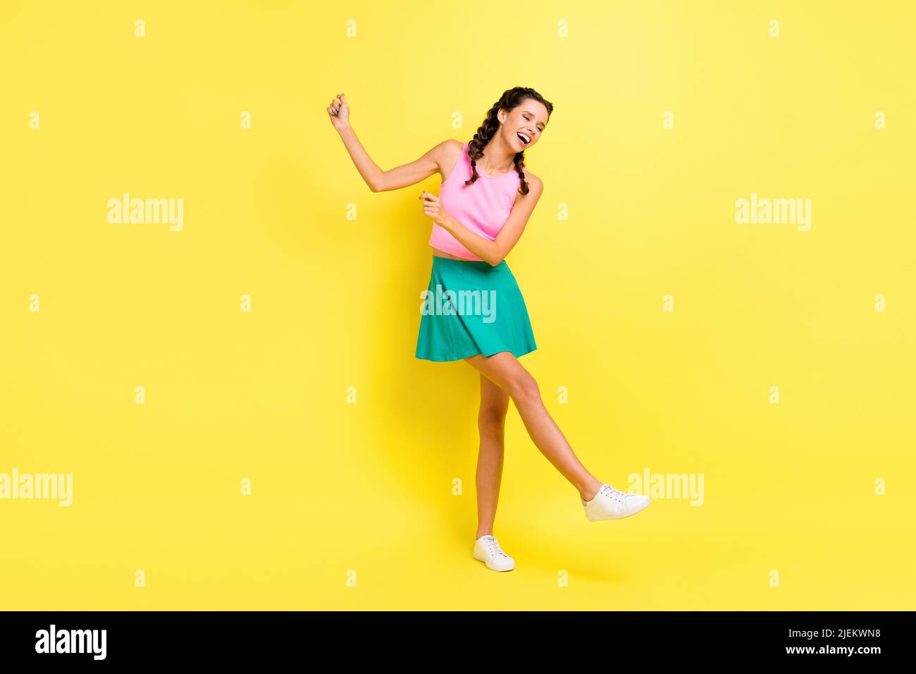 Full body photo of funky happy nice young lady raise hands happy dance ...