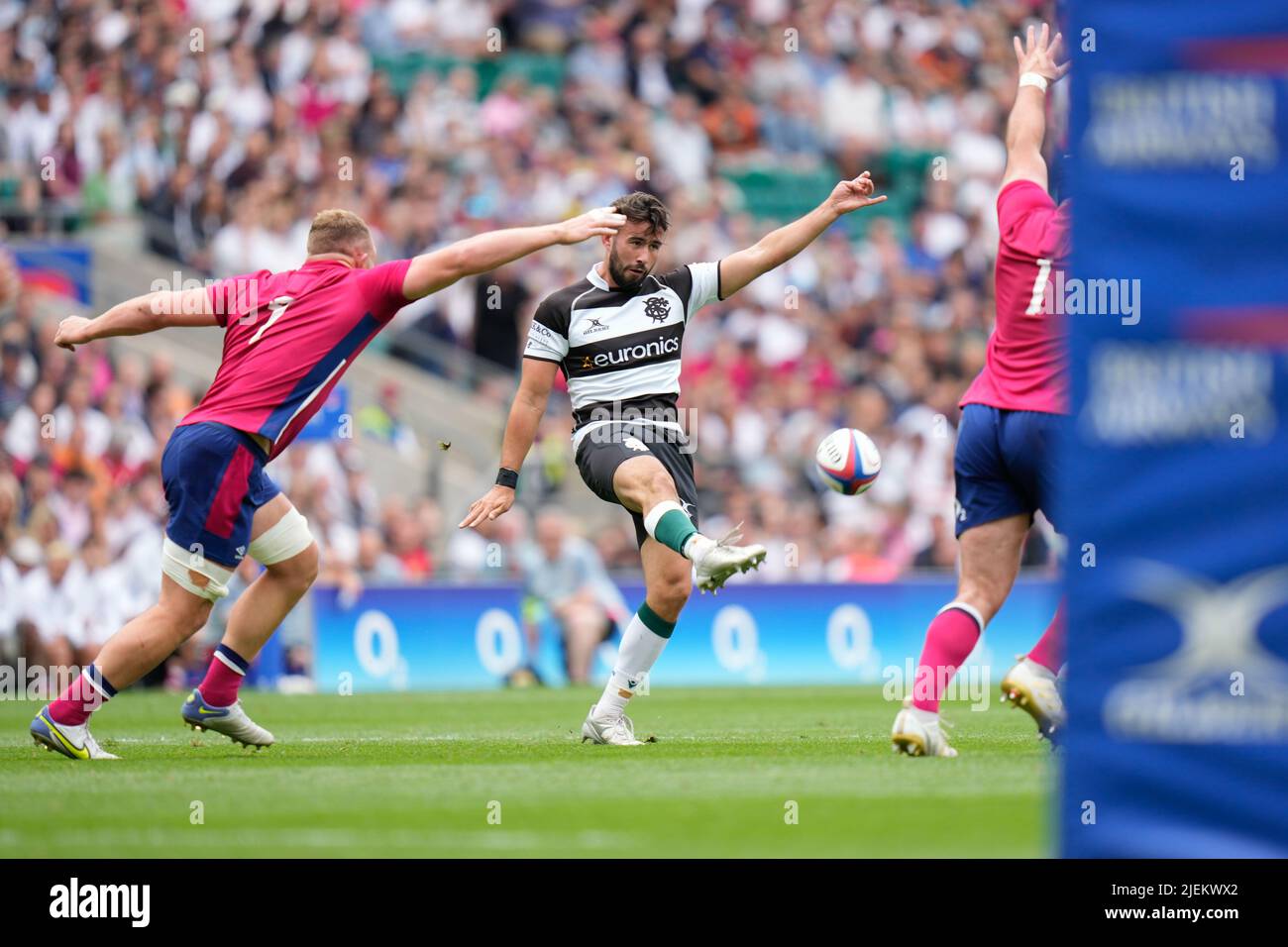 Barbarians fly half Antione Hastoy chips then ball across Field during ...