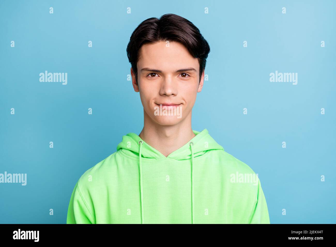 Photo of funky attractive young gentleman wear green sweatshirt smiling ...