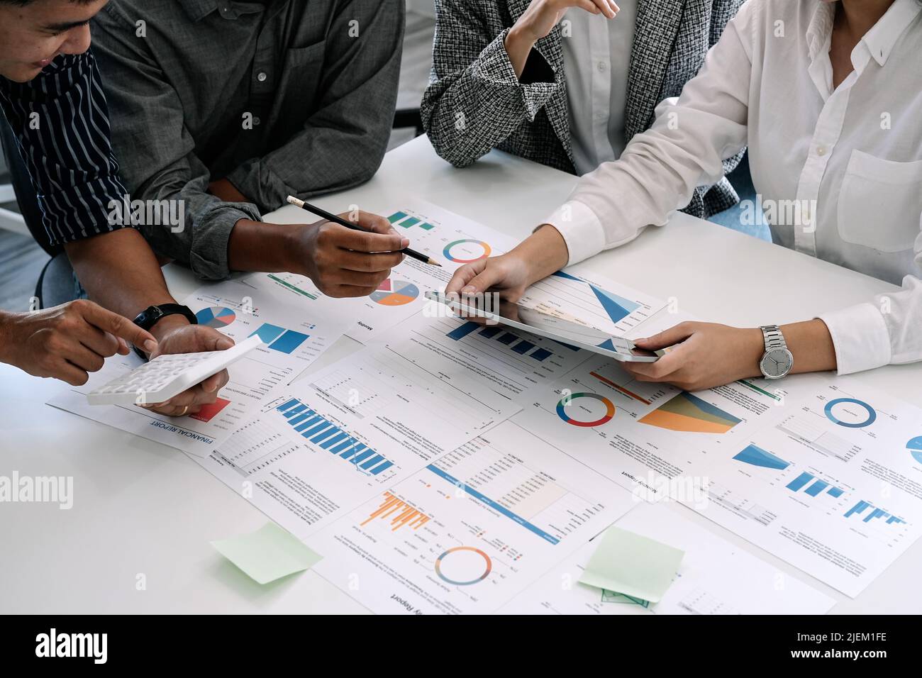 Financial,accounting, investment advisor consulting with her team at ...