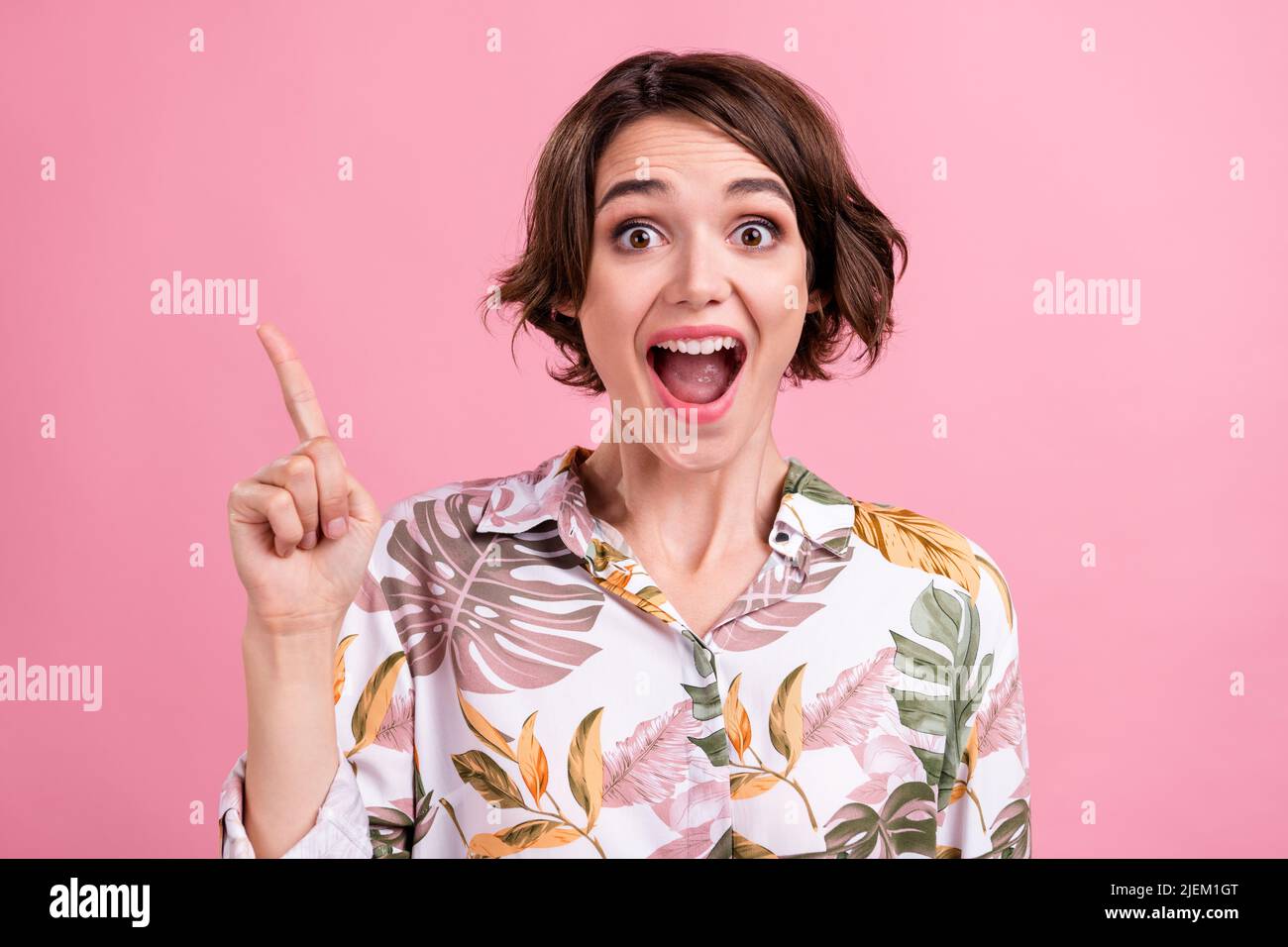Photo of young girl happy positive smile have idea point finger ...