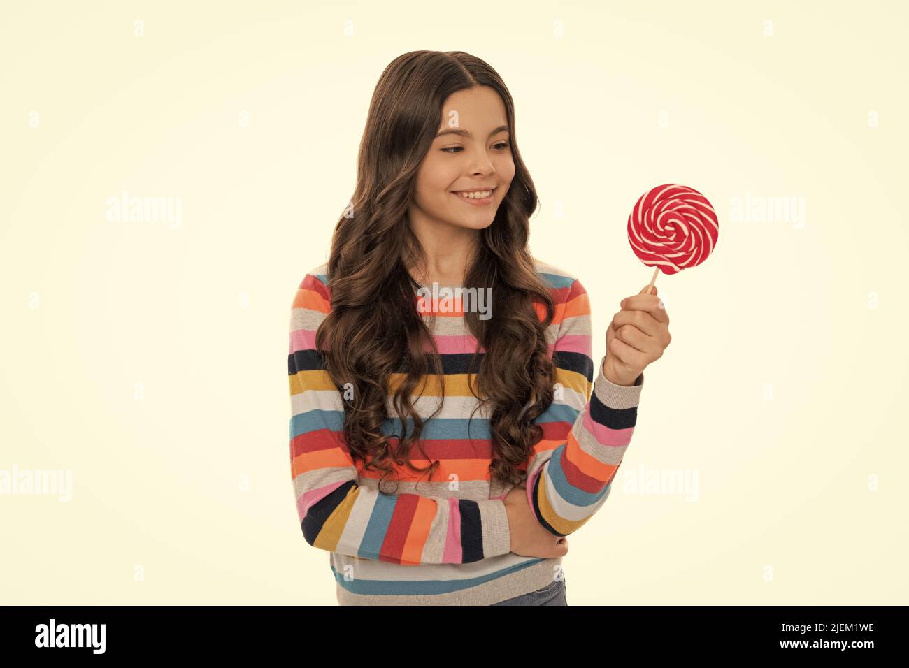 happy childhood. teen dental care. sweet tooth. yummy. happy girl hold ...