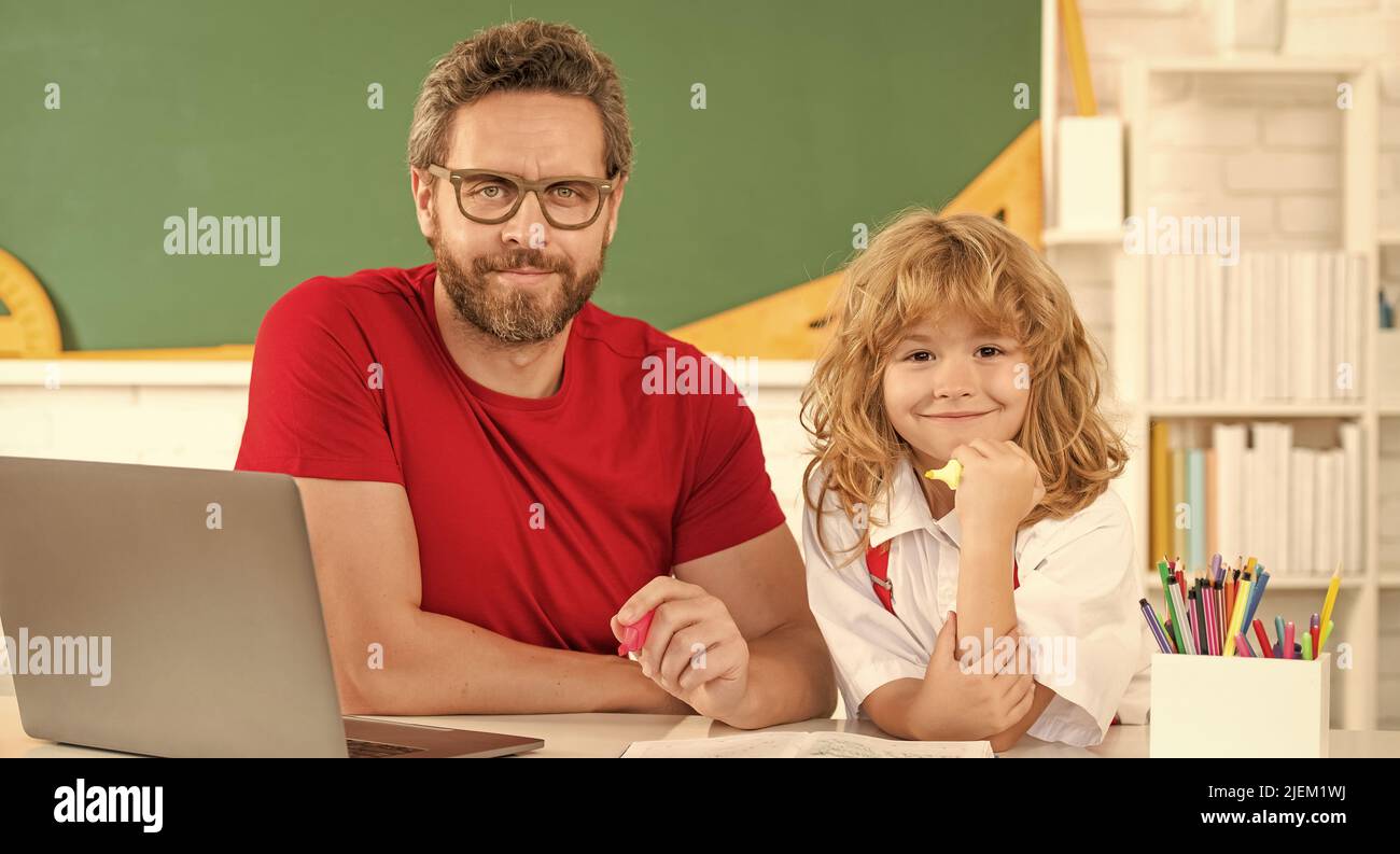 father and son study in classroom with laptop, online education Stock ...