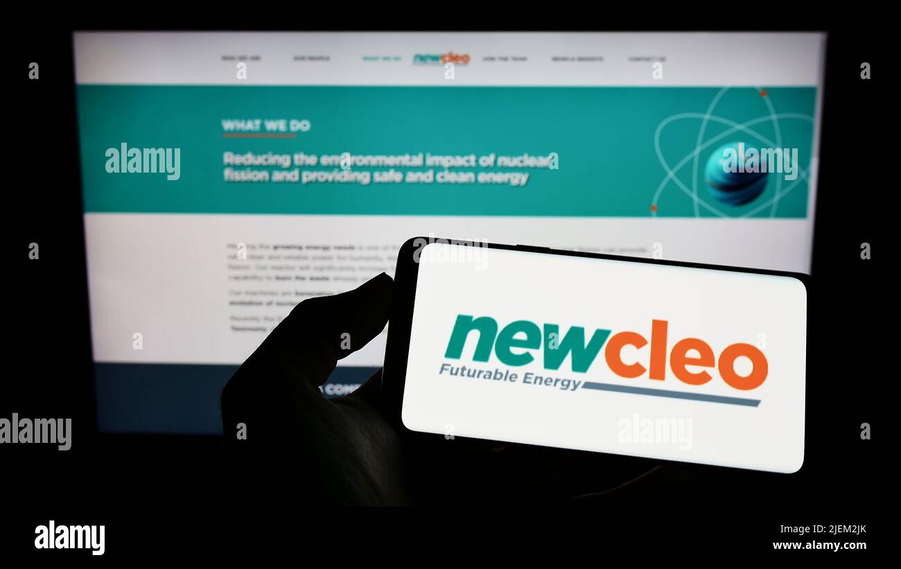 Person holding cellphone with logo of British energy company newcleo S ...