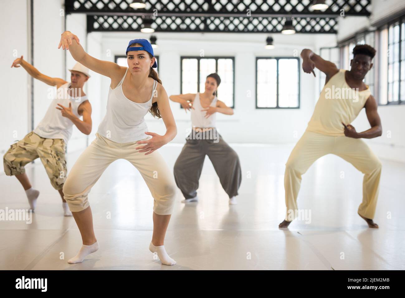 Team of dancers performing hip-hop dance Stock Photo - Alamy