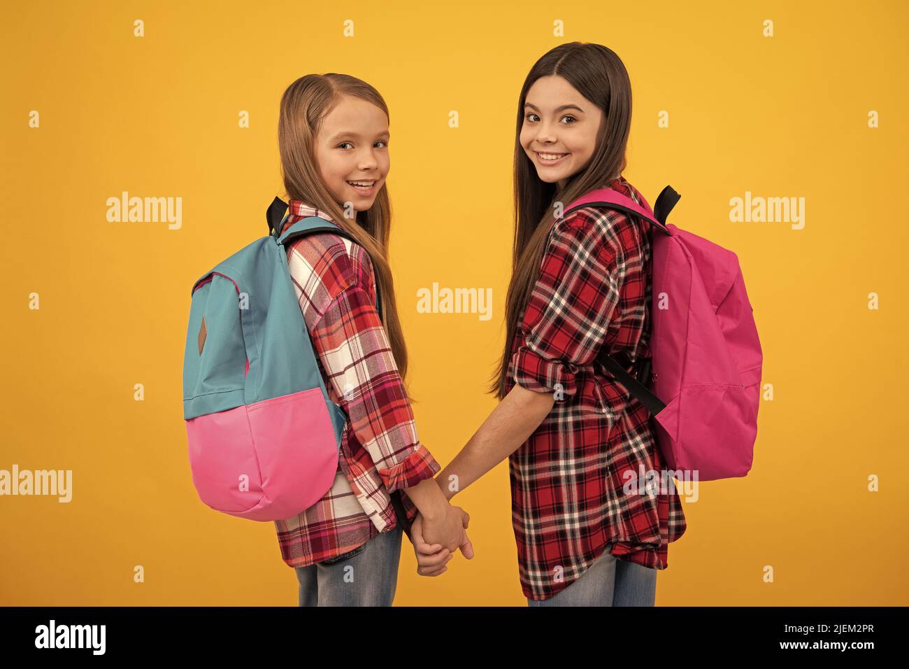 happy childhood. children with school bag. cute teen girls carry ...