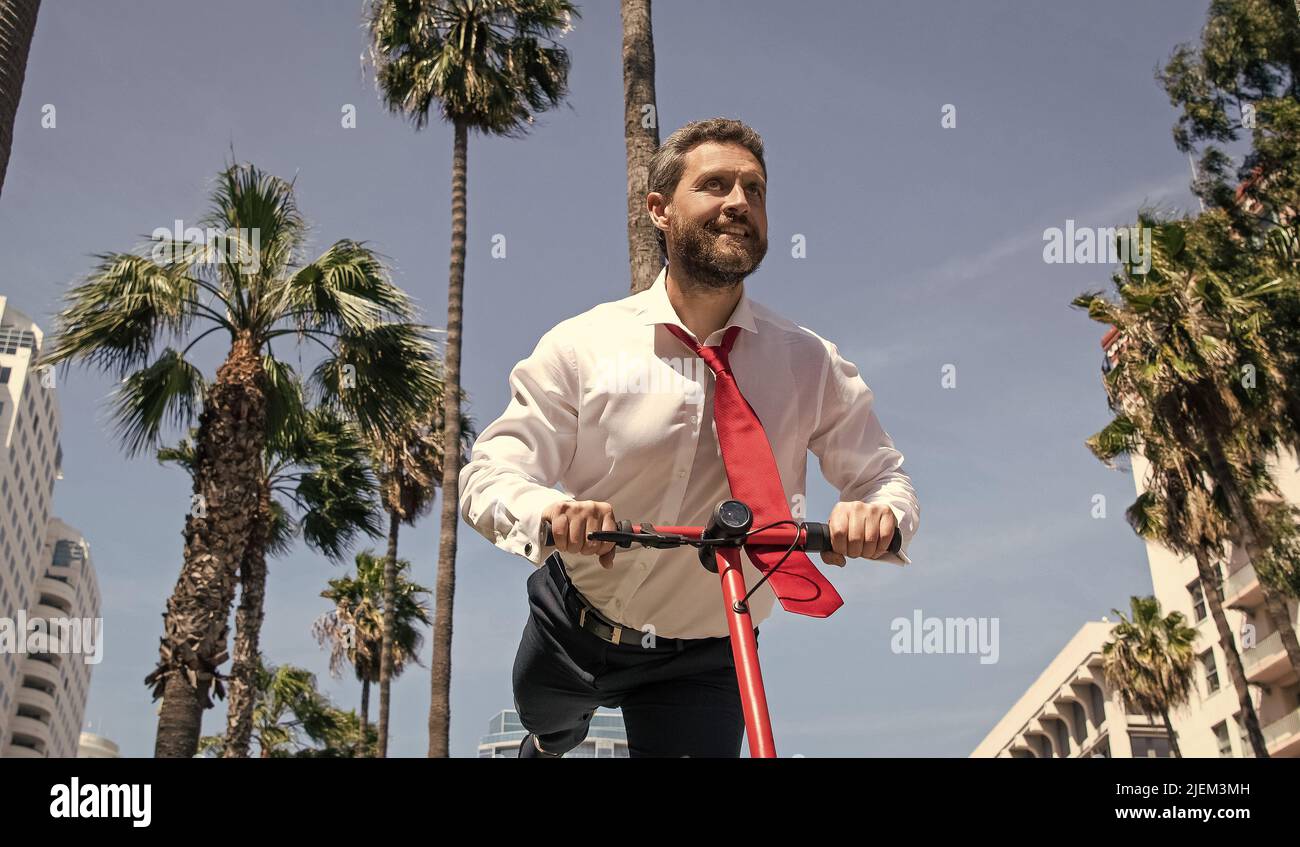 Take your escooter game to the next level. Happy employee ride escooter ...