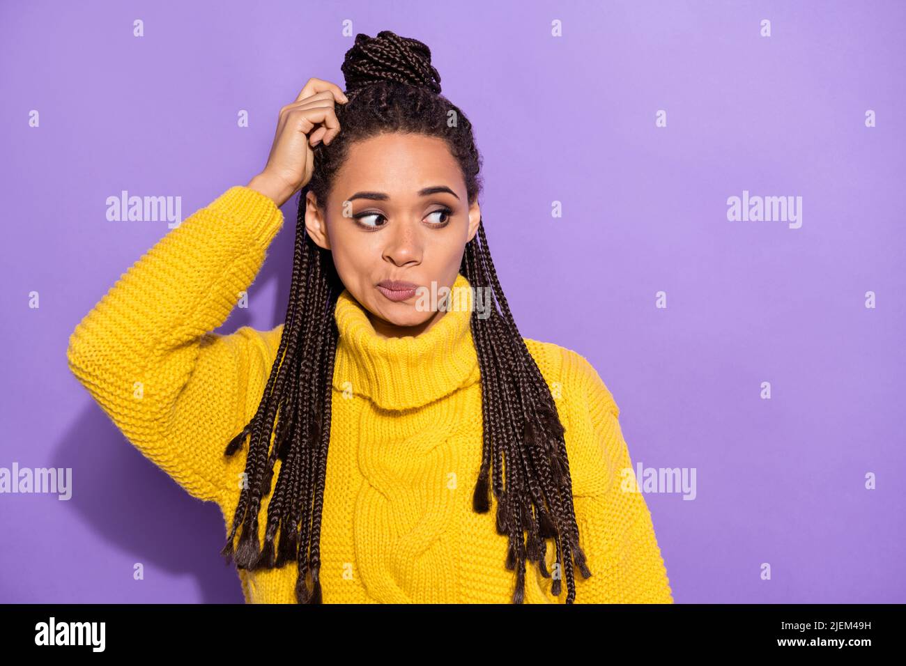 Photo of unsure nice brunette girl look empty space wear yellow sweater ...