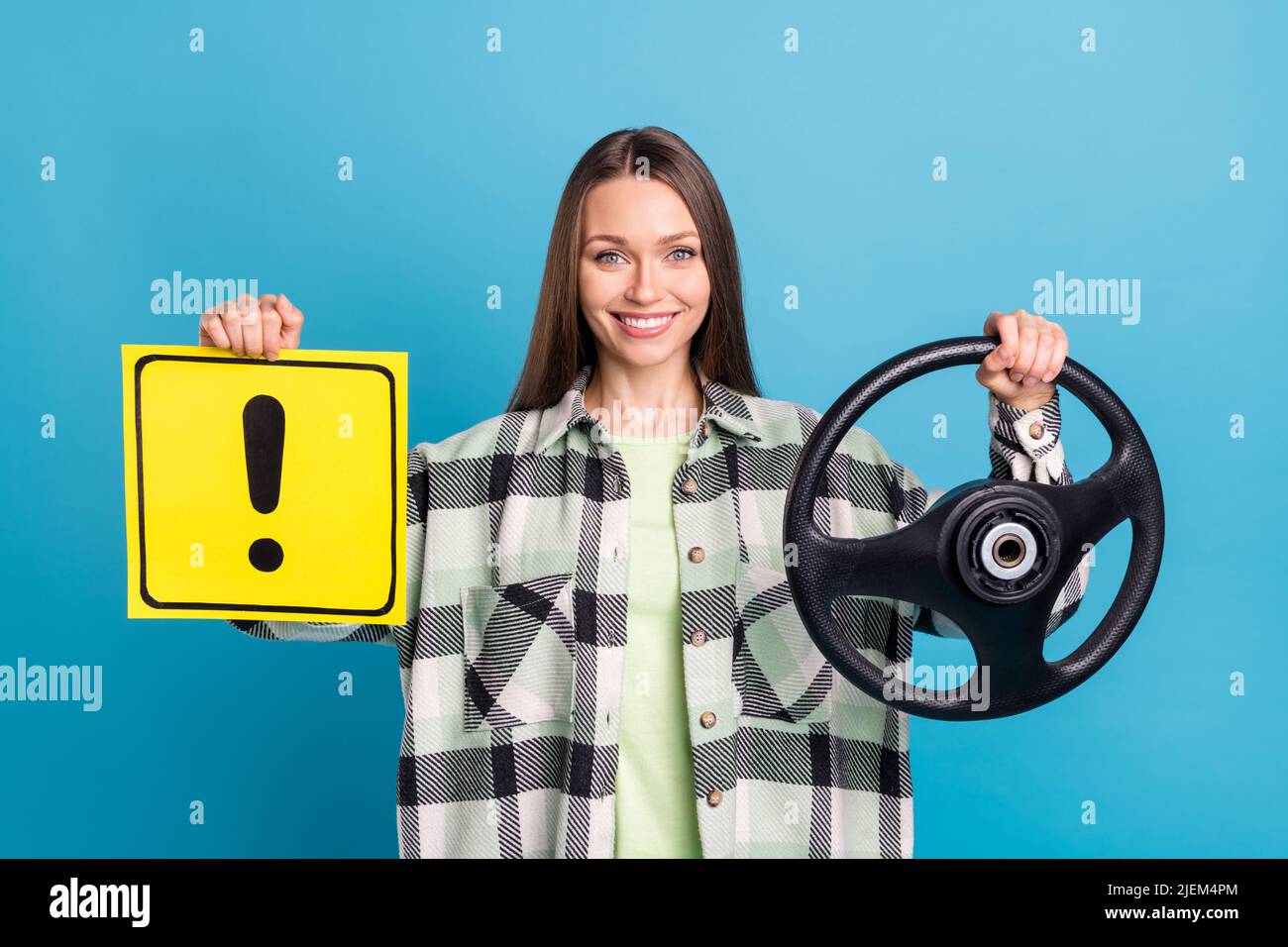 Photo of young girl happy positive smile hold steering-wheel attention ...