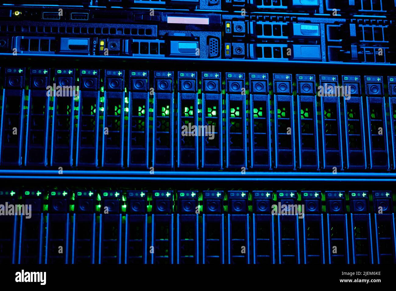 Graphic background image of blade servers in blue neon light stacked in ...