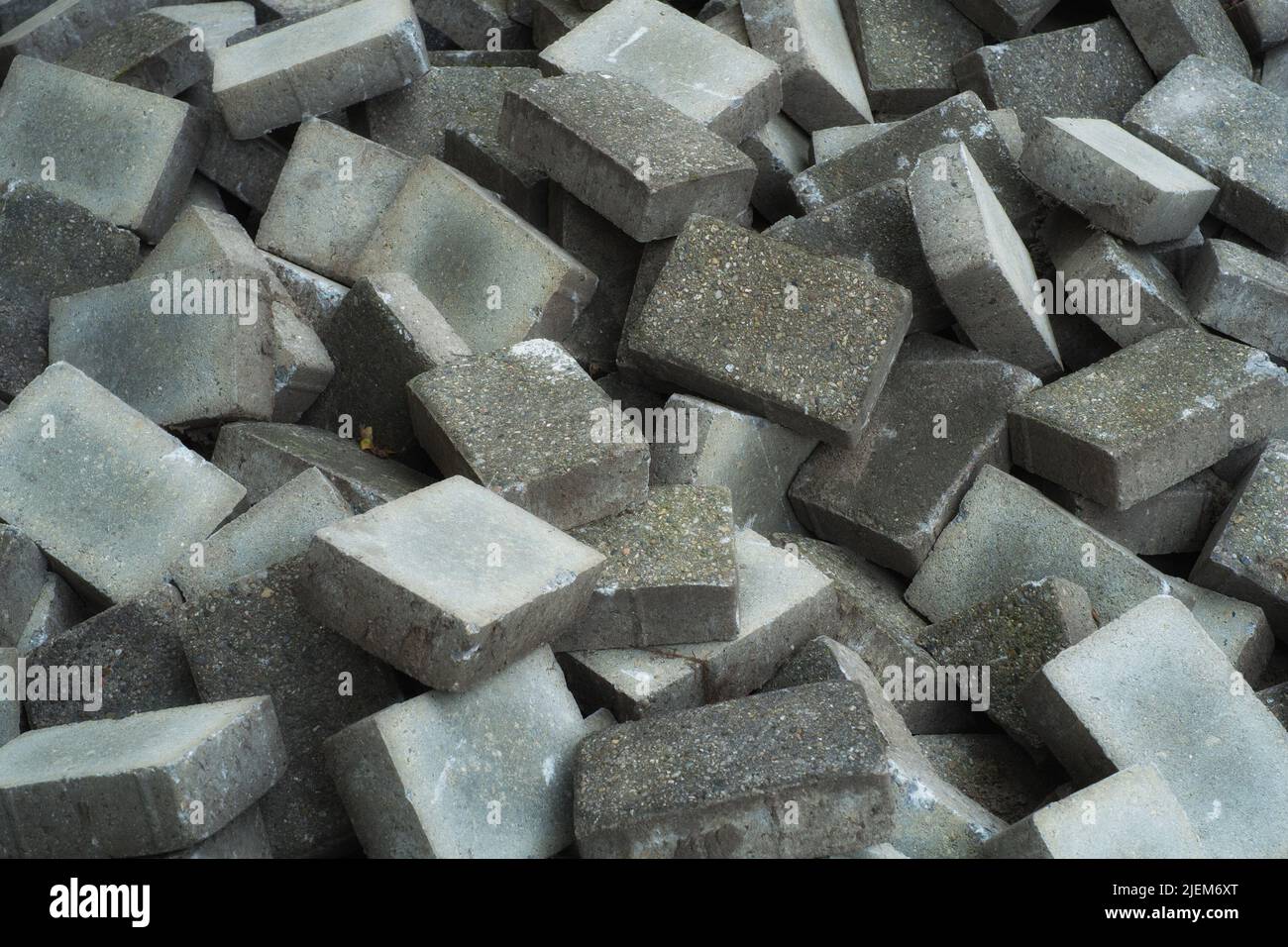 Pile of grey concrete bricks background Damp building bricks lying on ...