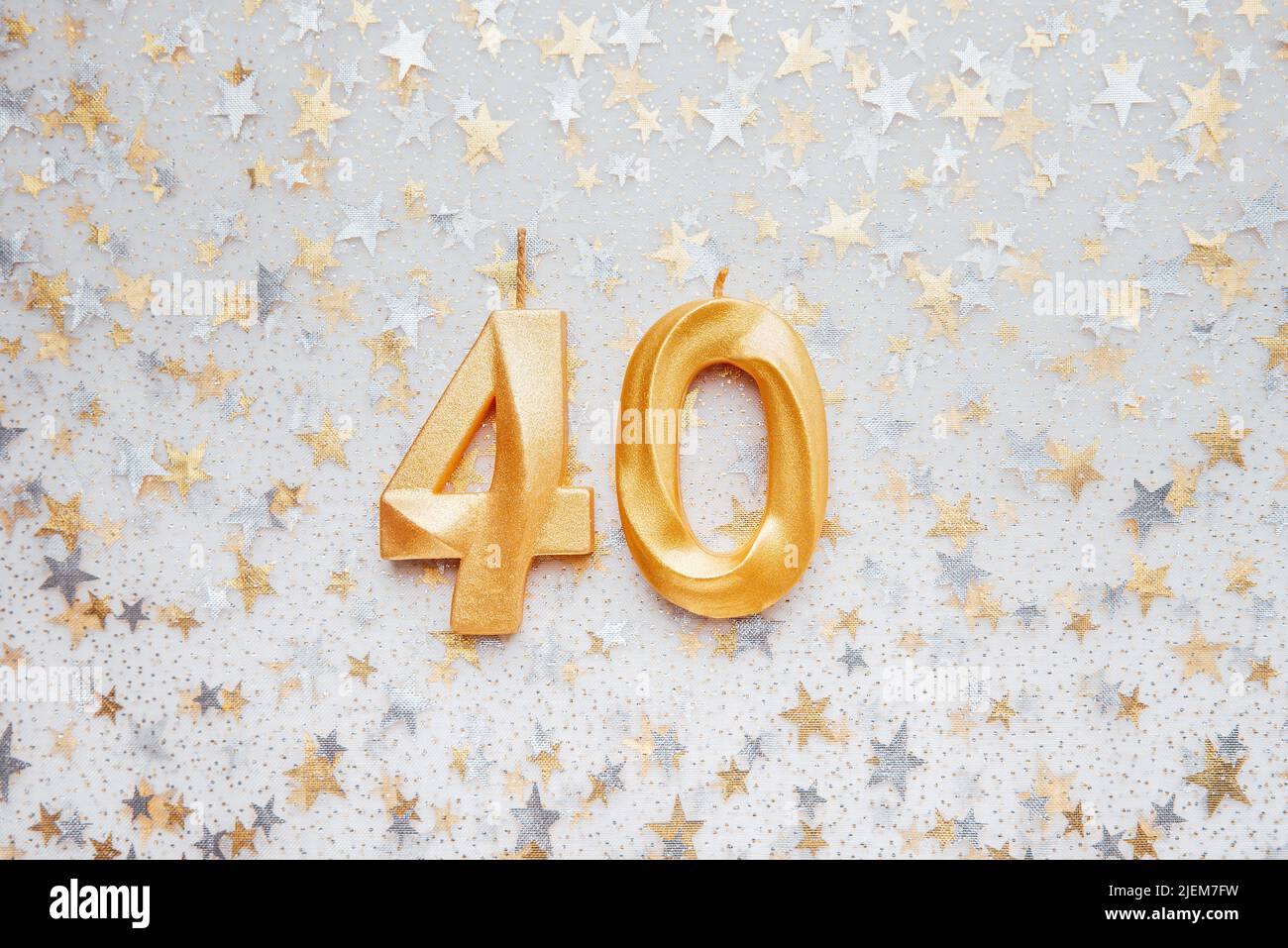 Number 40 fourty golden celebration birthday candle on Festive ...